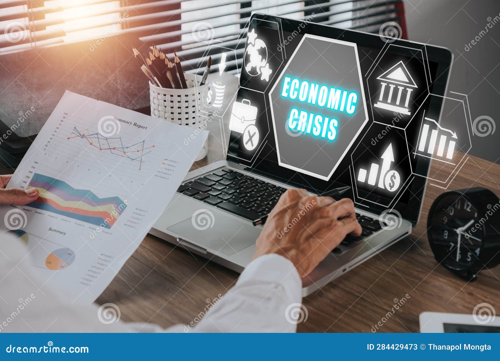 Businessman Working on Laptop Computer with Economic Crisis Icon on ...