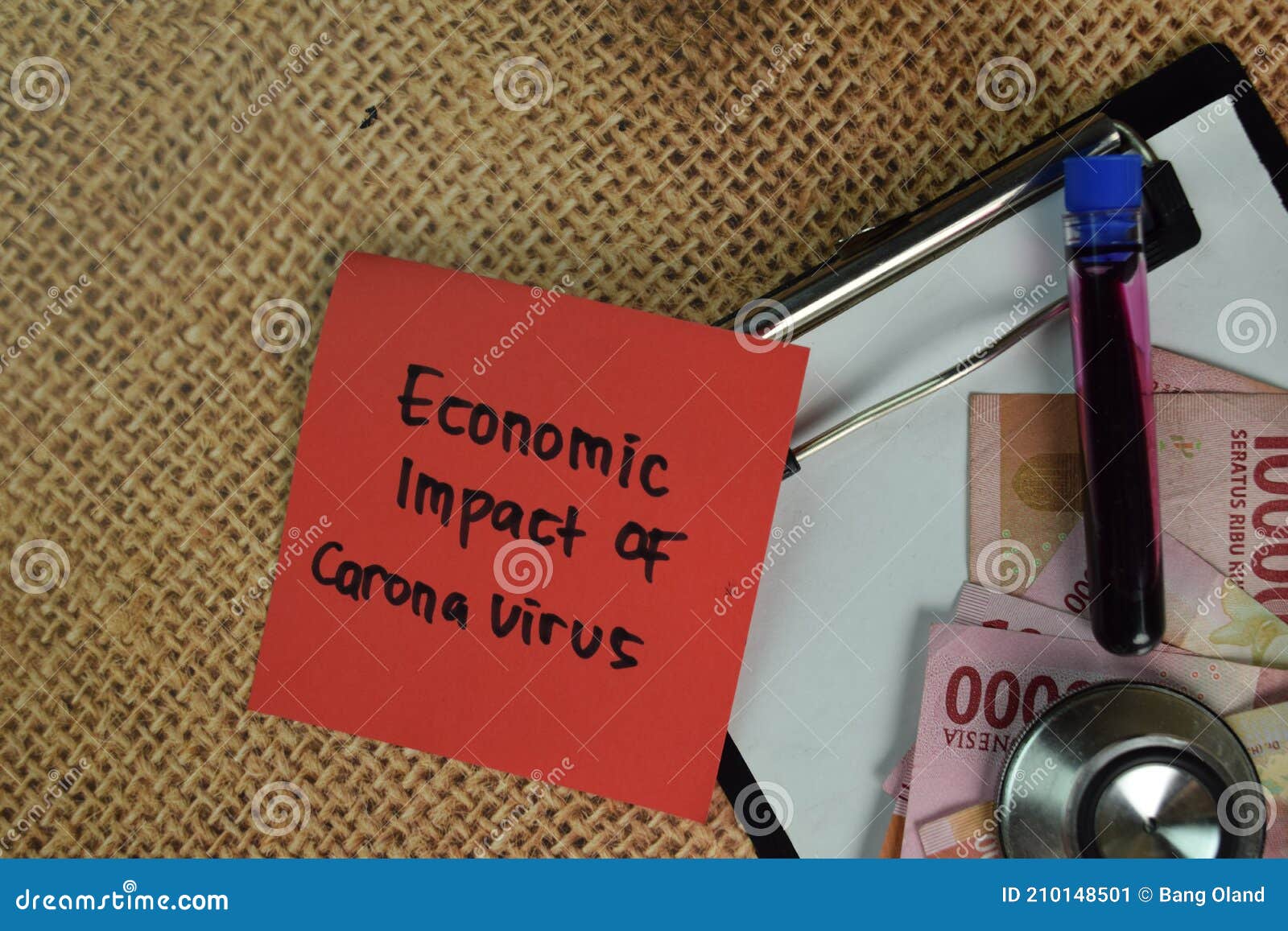 Economic Impact of Coronavirus Write on Sticky Notes Isolated on Wooden ...