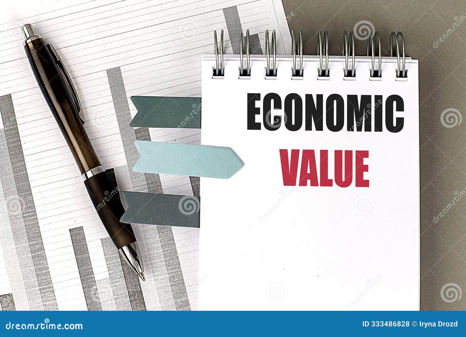 ECONOMIC VALUE Text on Notebook with Chart on Gray Background Stock ...