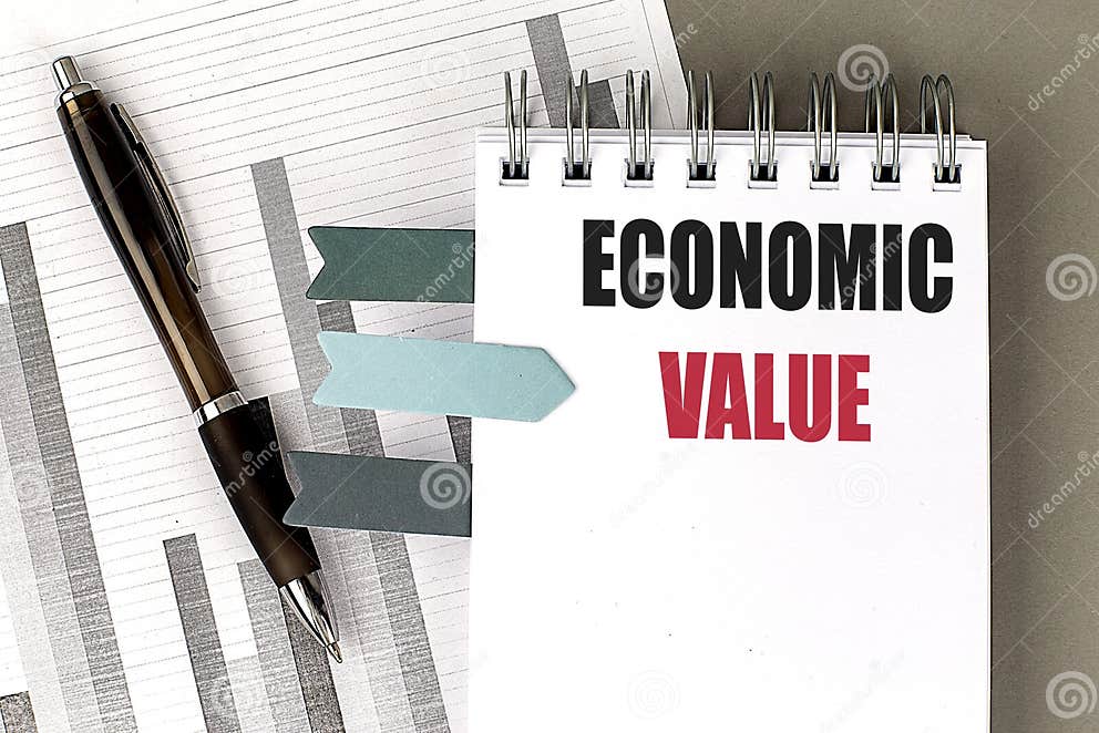 ECONOMIC VALUE Text on Notebook with Chart on Gray Background Stock ...