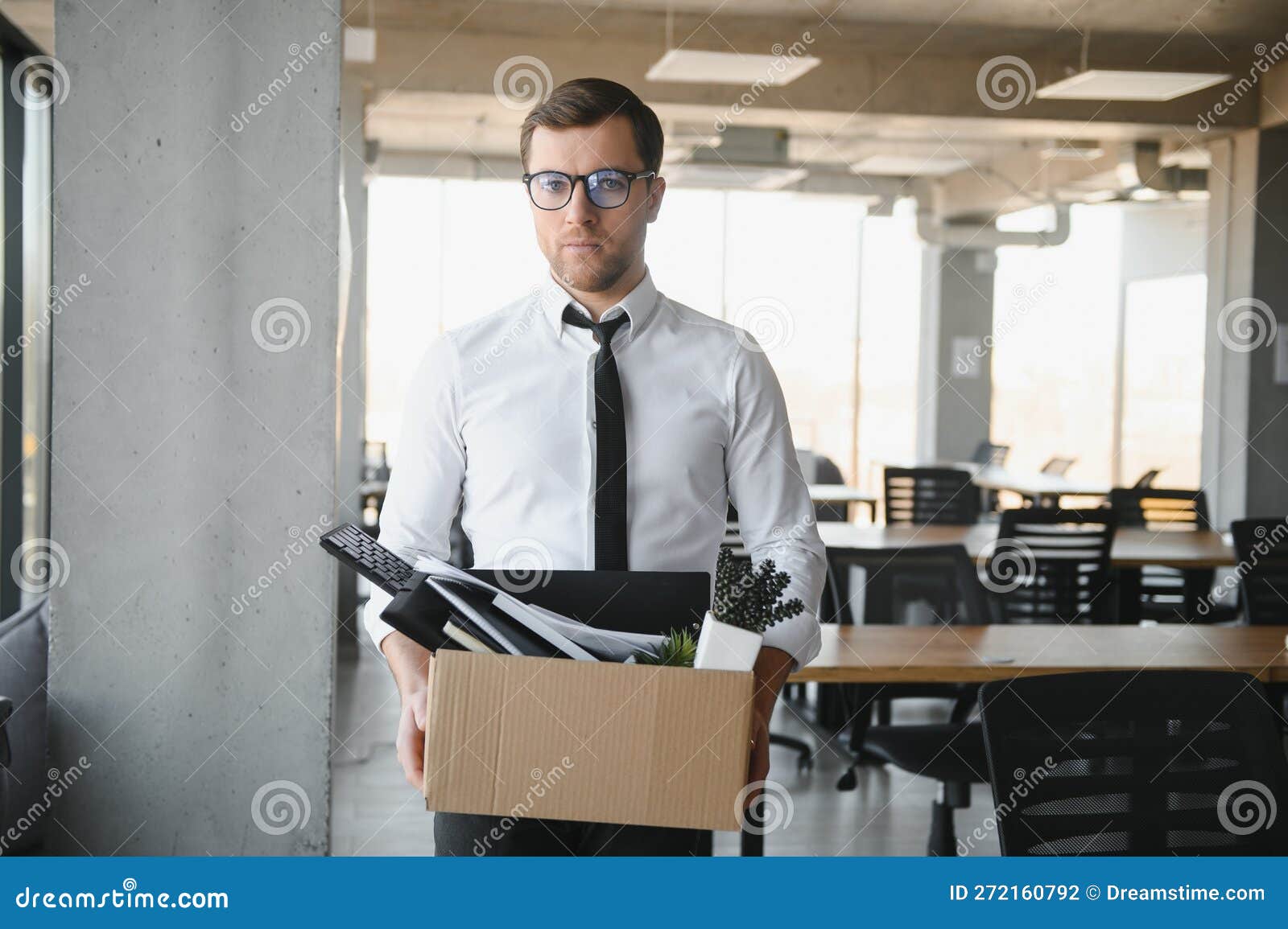 Economist Leaving Office. Handsome Economist Leaving the Office Taking ...