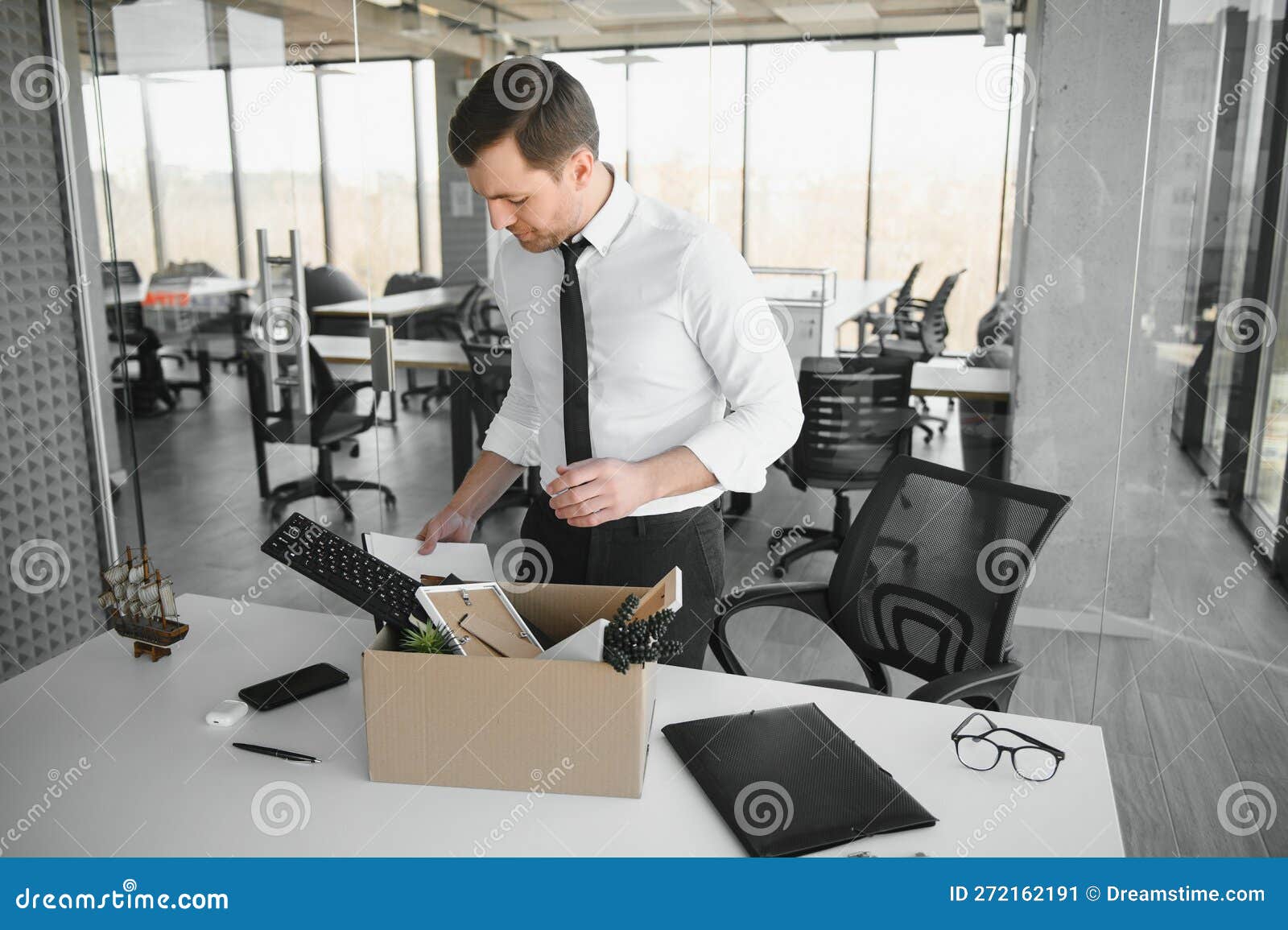 Economist Leaving Office. Handsome Economist Leaving the Office Taking ...