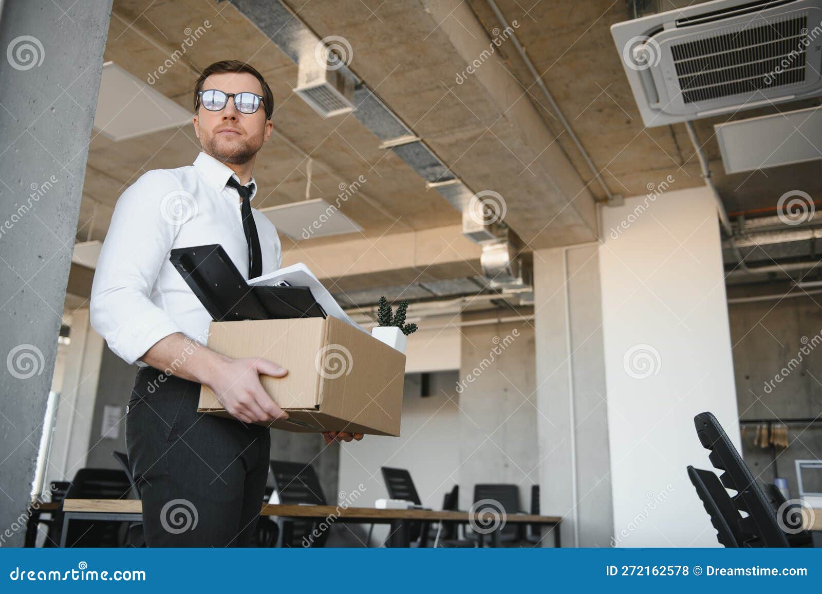 Economist Leaving Office. Handsome Economist Leaving the Office Taking ...