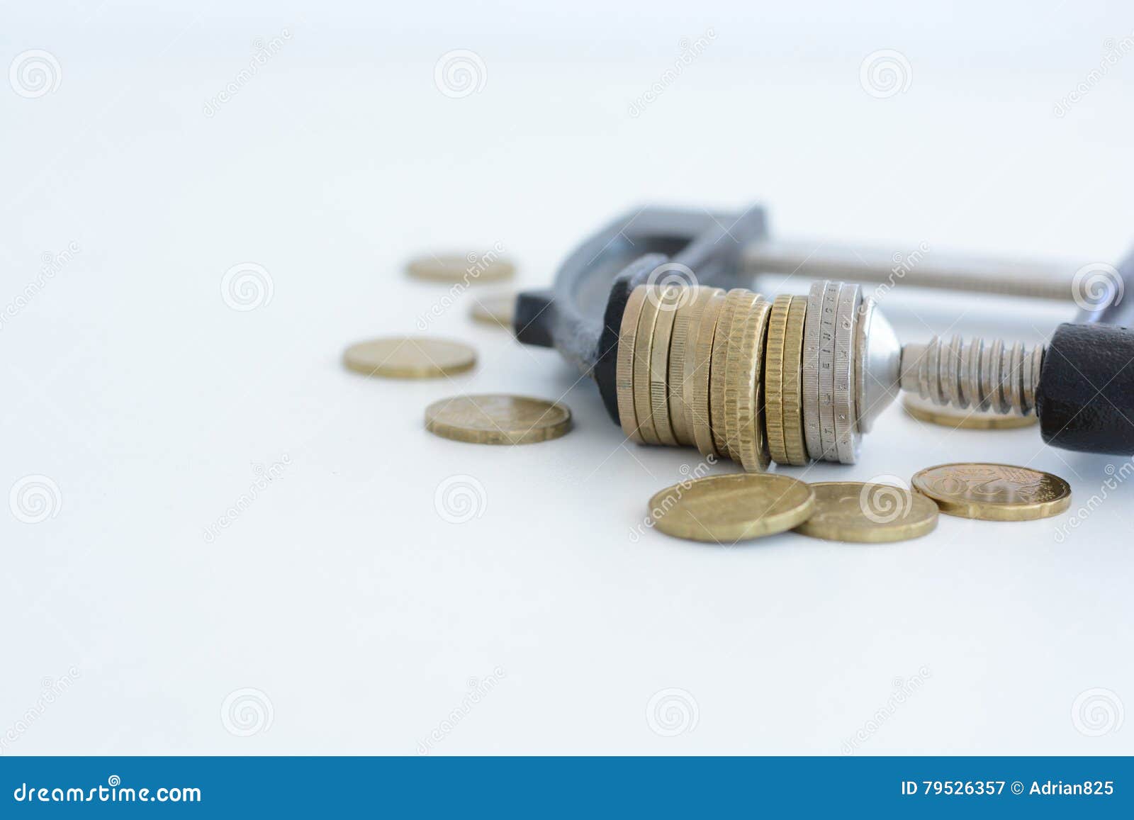 Economy Pressure Concept with Stack of Coins in a Cramp Stock Image ...