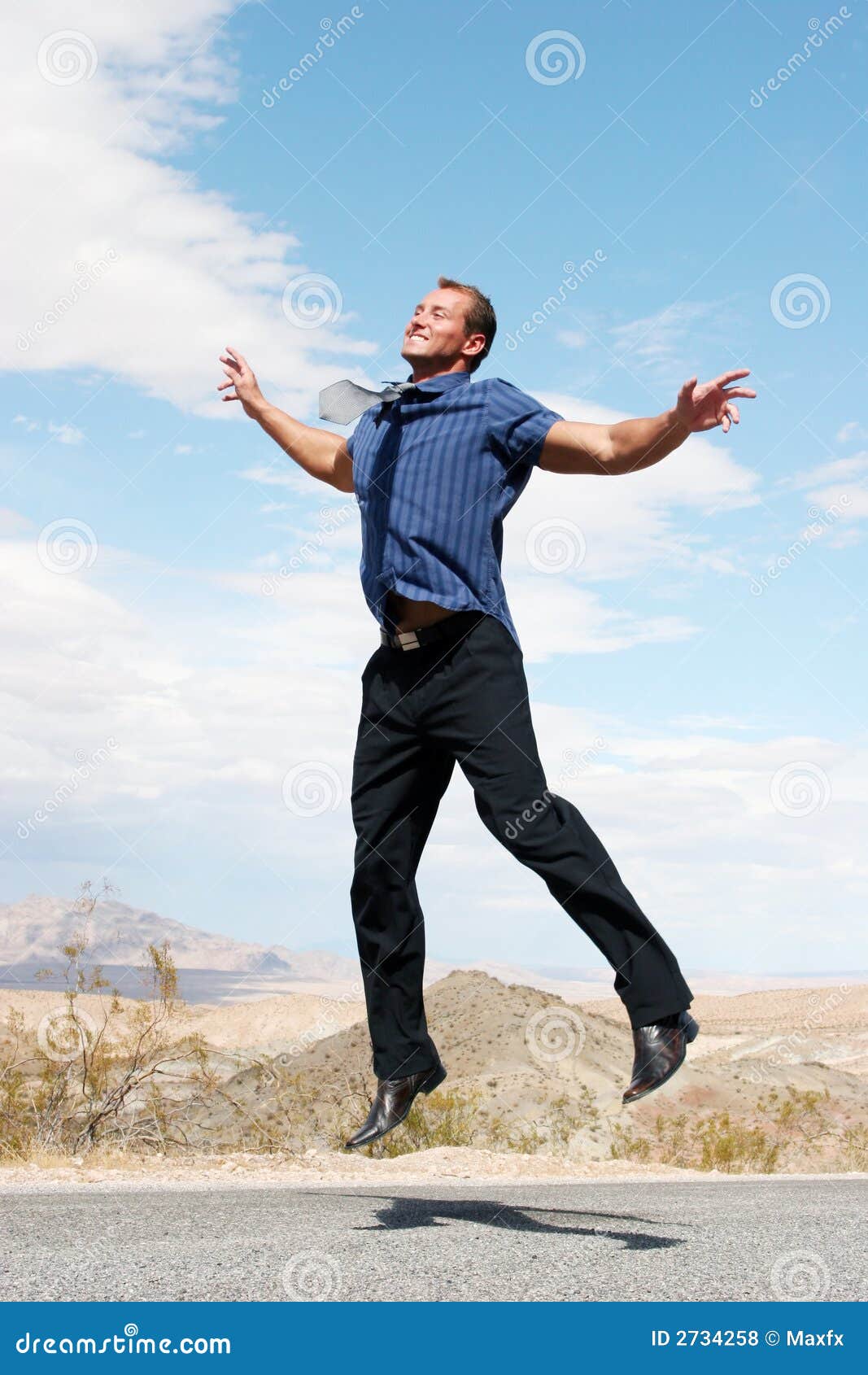 Ecstatic Businessman Jumping Stock Photo - Image of blue, energy: 2734258