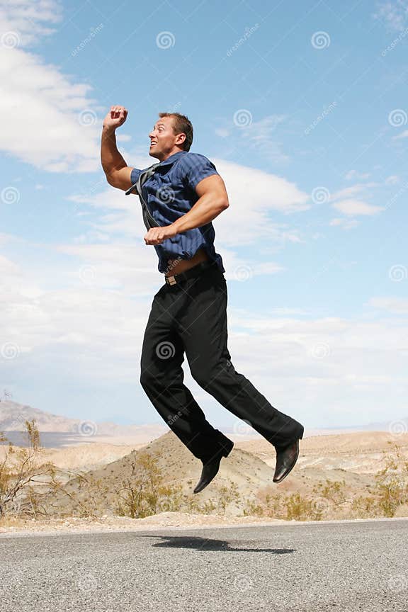 Ecstatic Businessman Jumping Stock Image - Image of confident, ecstatic ...