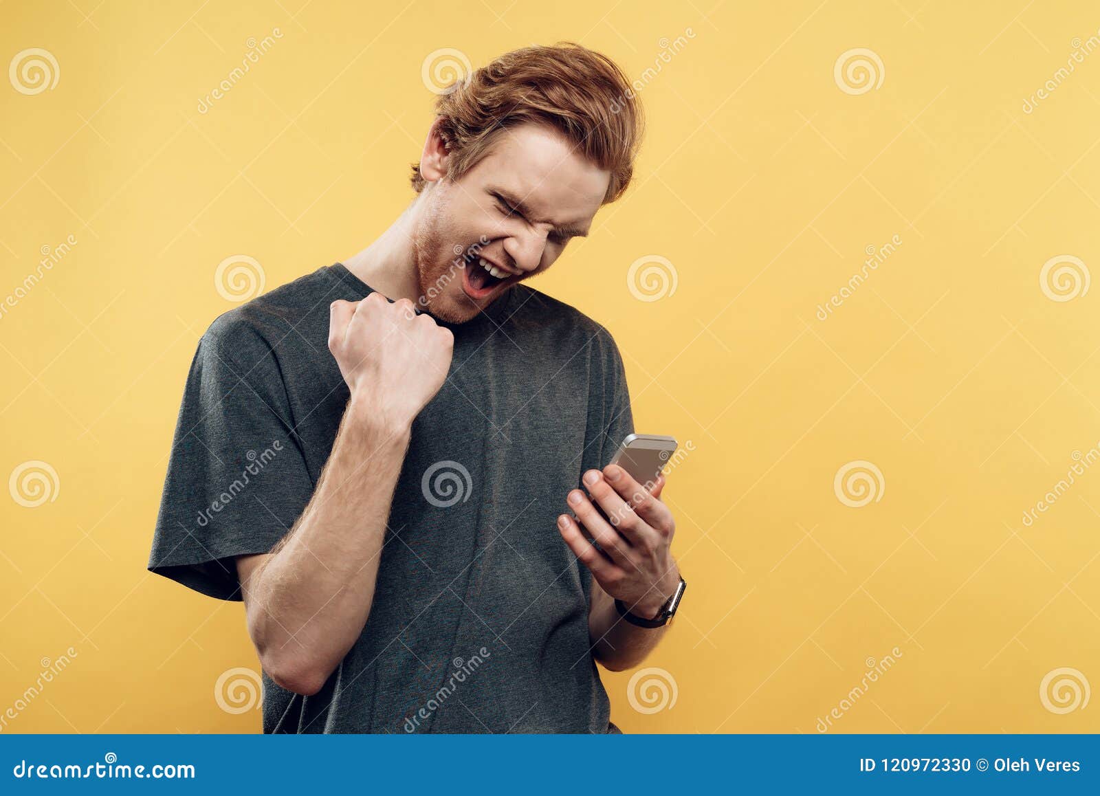 Ecstatic Guy Celebrating Success Using Smartphone Stock Photo - Image ...