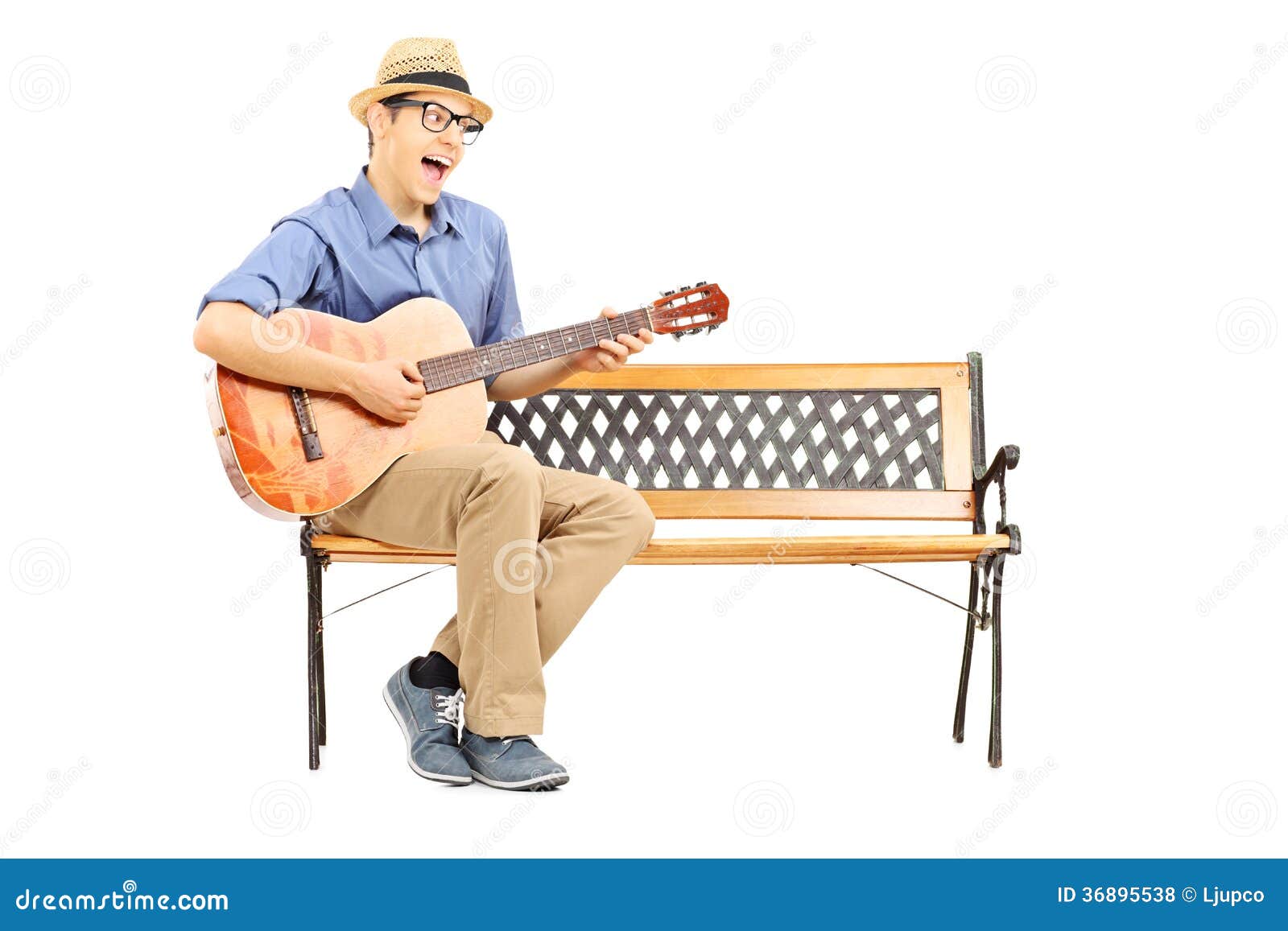 Ecstatic Young Guitarist Sitting on Bench and Singing Stock Photo ...