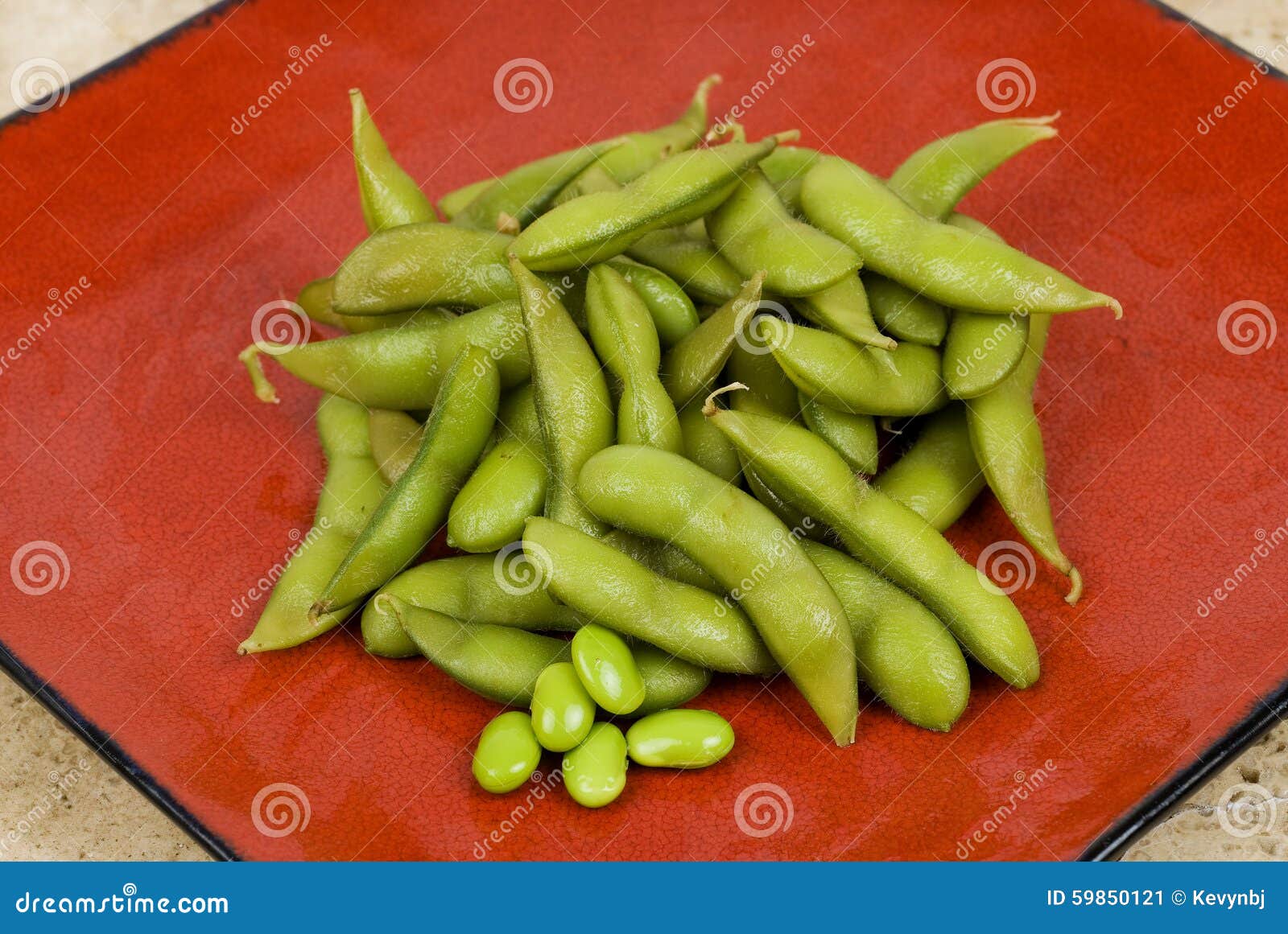 Edamame on a Red Plate stock image. Image of salted, shelled - 59850121
