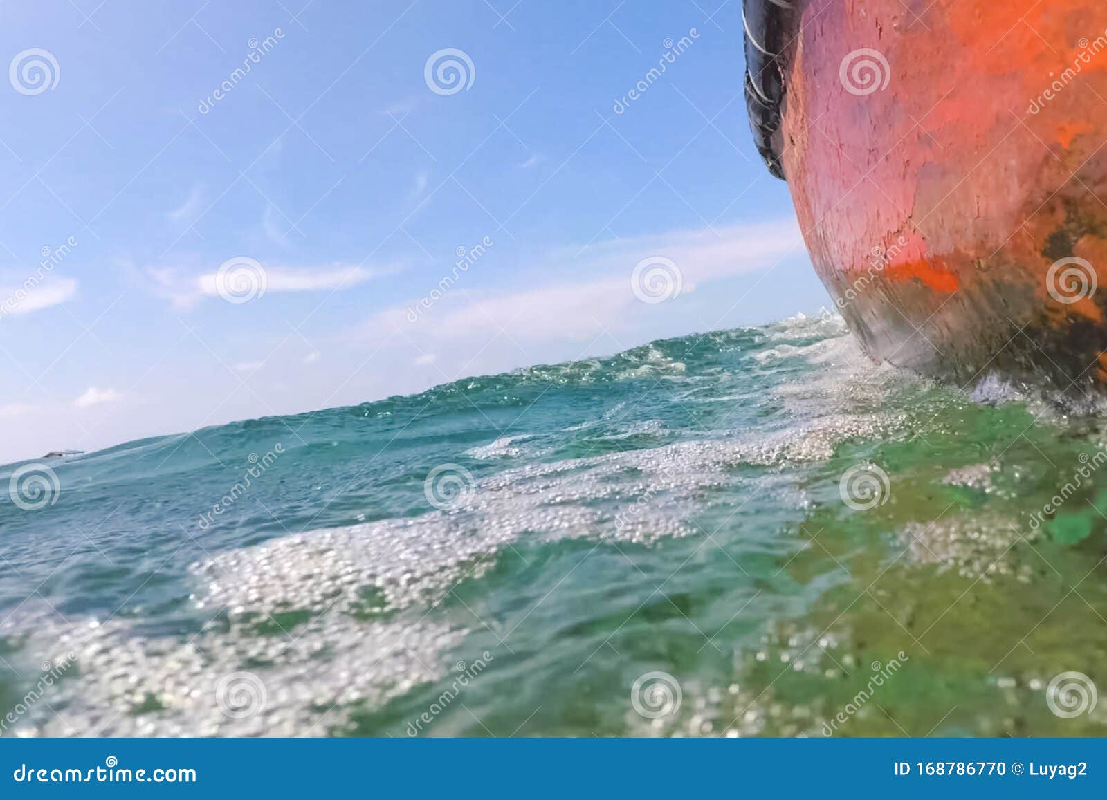 The Edge of a Boat Sailing in the Sea. Boat in Water Stock Photo ...