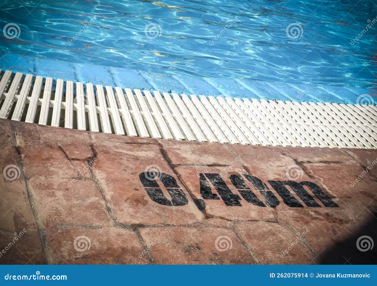 Edge of a swimming pool stock photo. Image of aquatic - 262075914