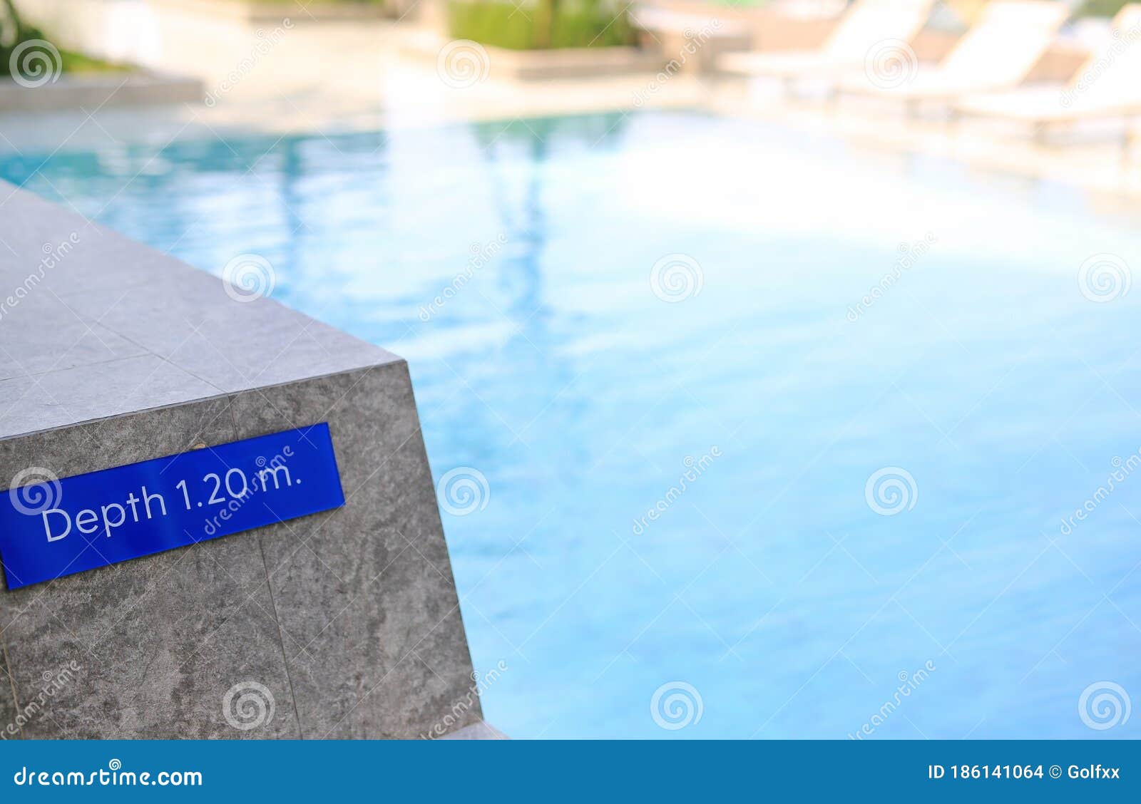 Edge of Swimming Pool and Sign Indicating the Depth 1.20 Meter of the ...