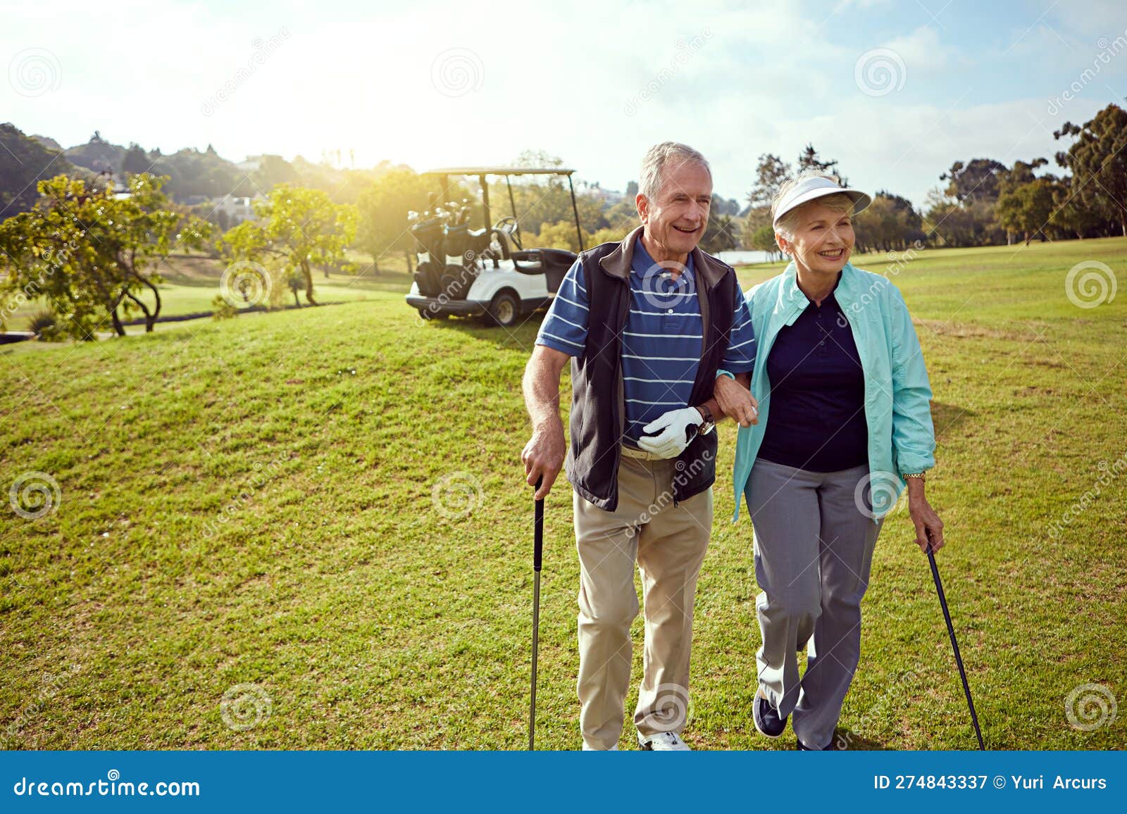 Edging Closer To the Hole. a Smiling Senior Couple Enjoying a Day on ... Edging Closer To the Hole. a Smiling Senior Couple Enjoying a Day on ...