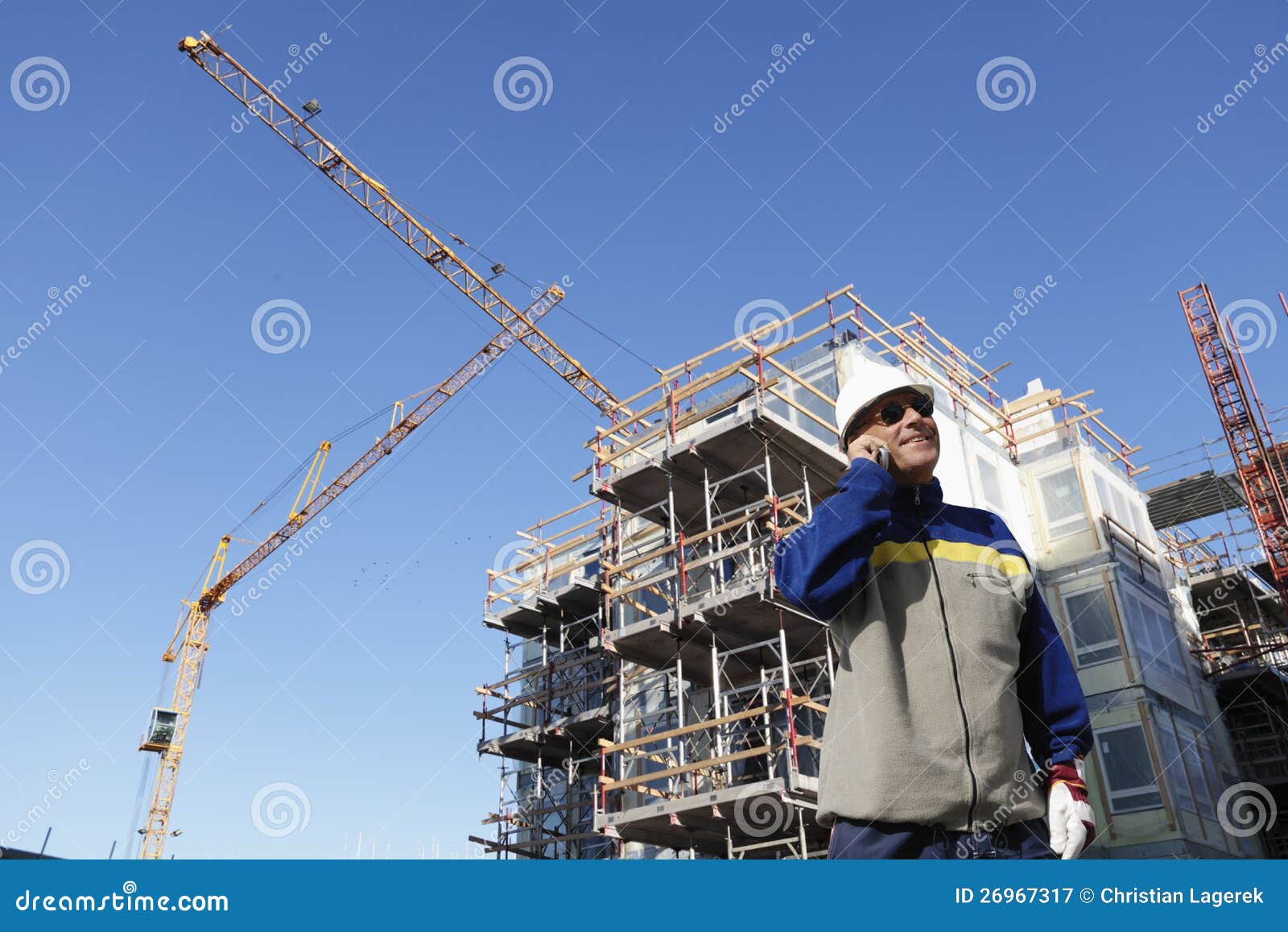 Edilizia ed operai immagine stock. Immagine di industria - 26967317