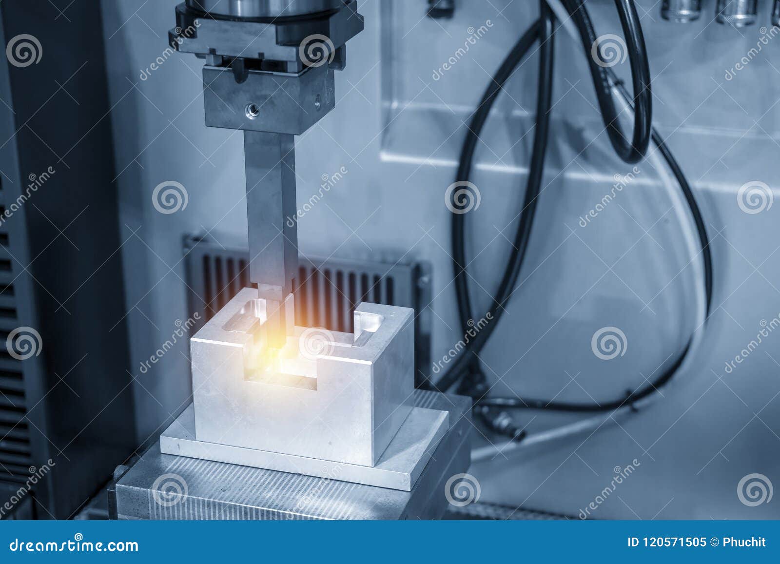 The EDM,Electric Discharge Machine with the Copper Electrode. Stock ...