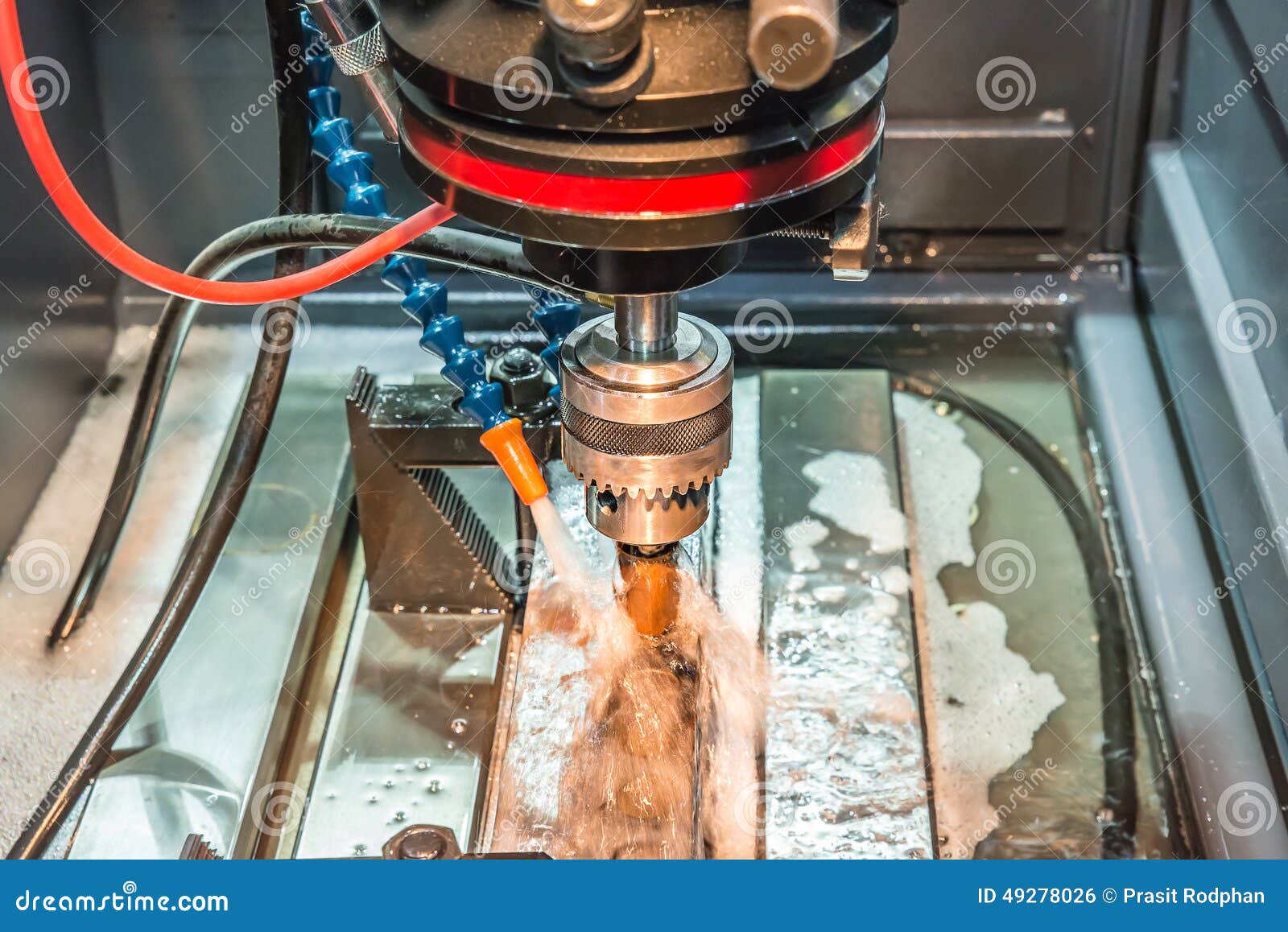 EDM Machine Working with Coolant Injection Stock Photo - Image of ...