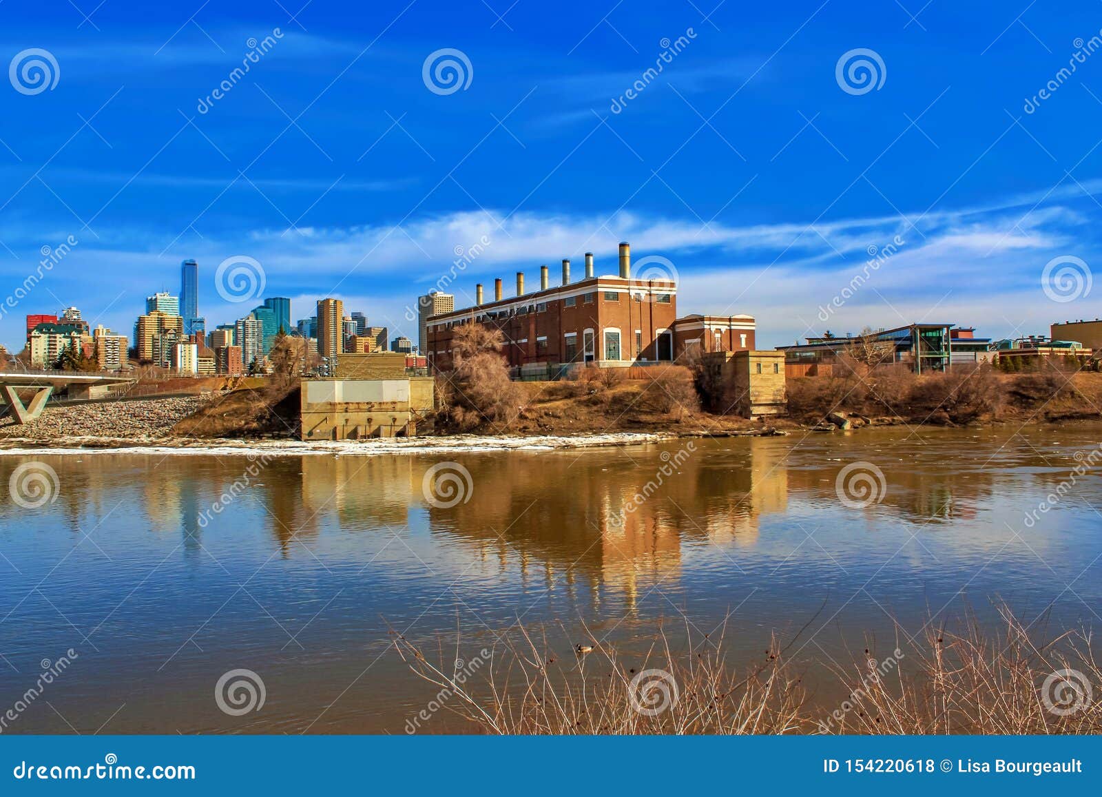 Edmonton Buildings Reflected in the Water Stock Photo - Image of clouds ...