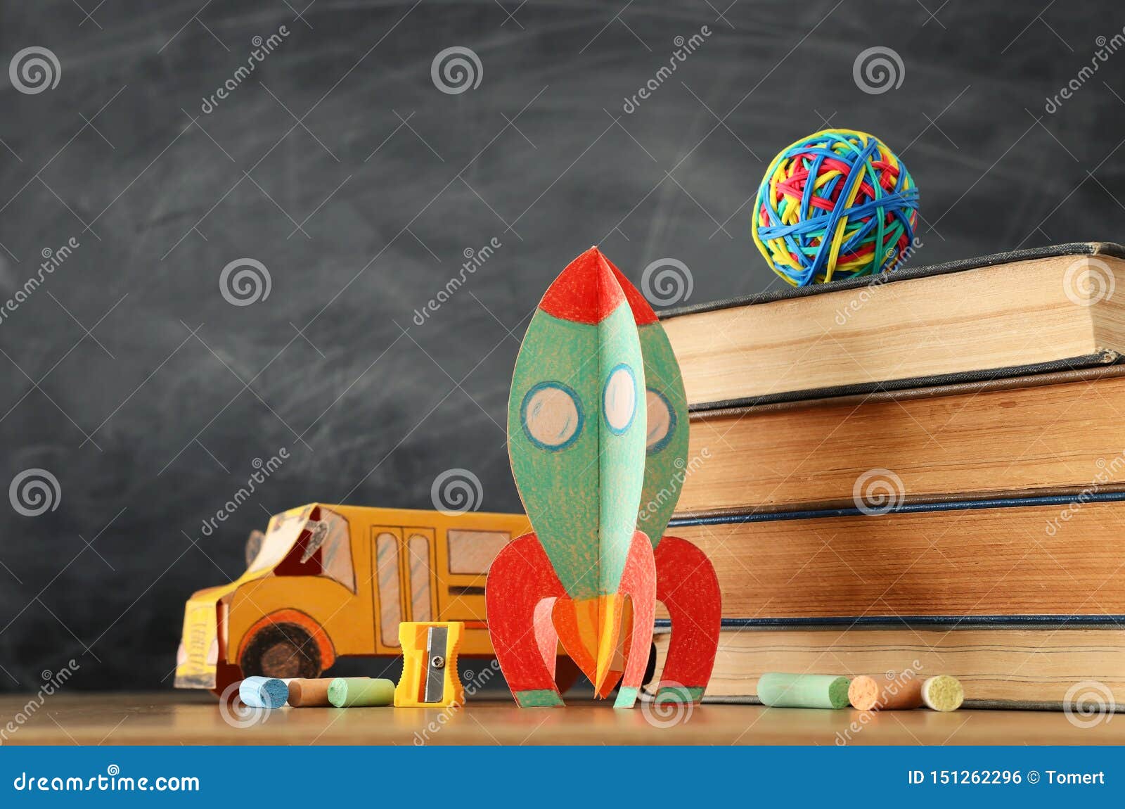 Education and Back To School Concept. Cardboard Rocket, Bus, Books and ...