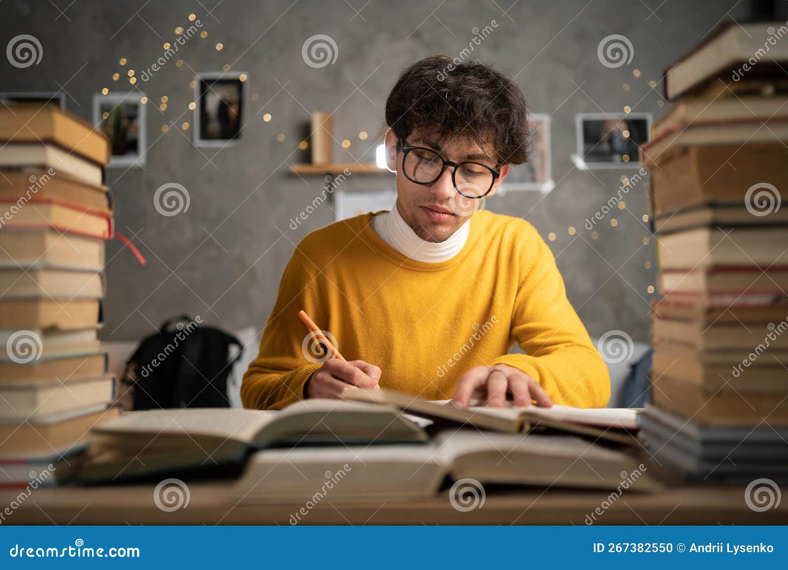 Education Concept. Arabic Student Studying in Dormitory at a Table with ...