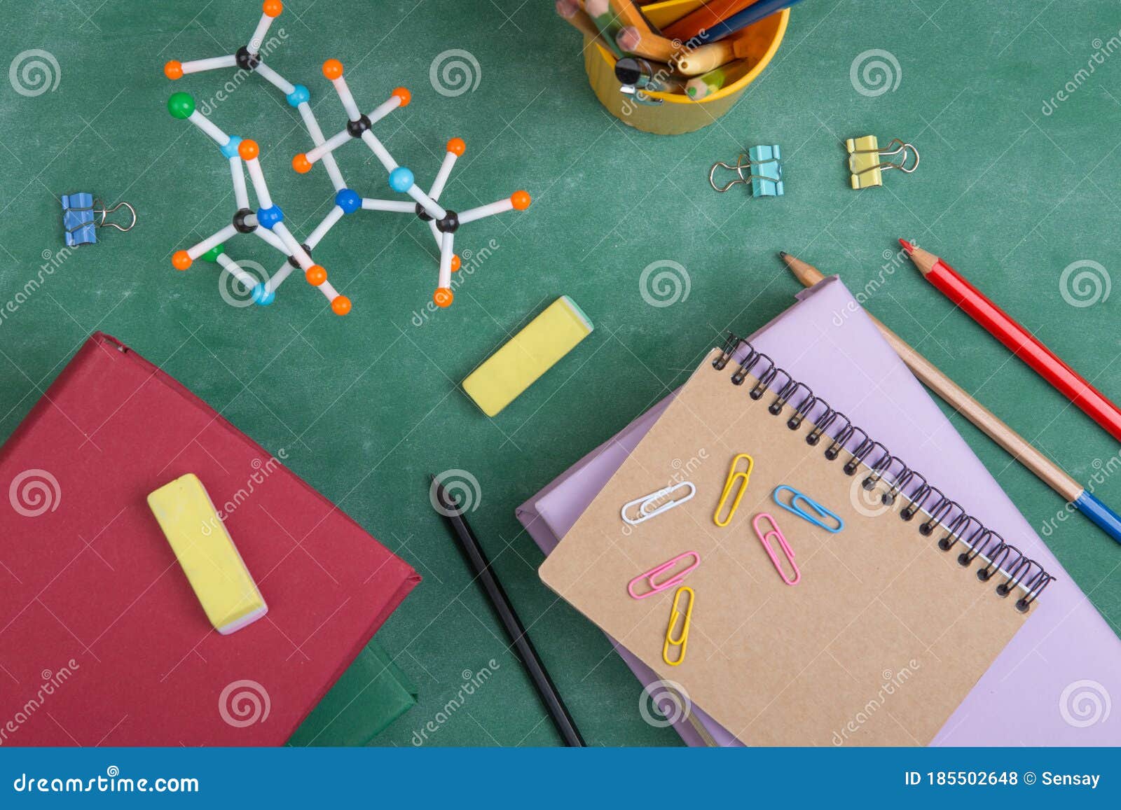 Education Concept - Books and Molecule Model on the Desk in the ...