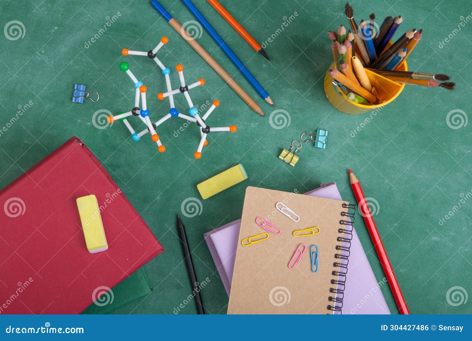 Education Concept - Books and Molecule Model on the Desk in the ...