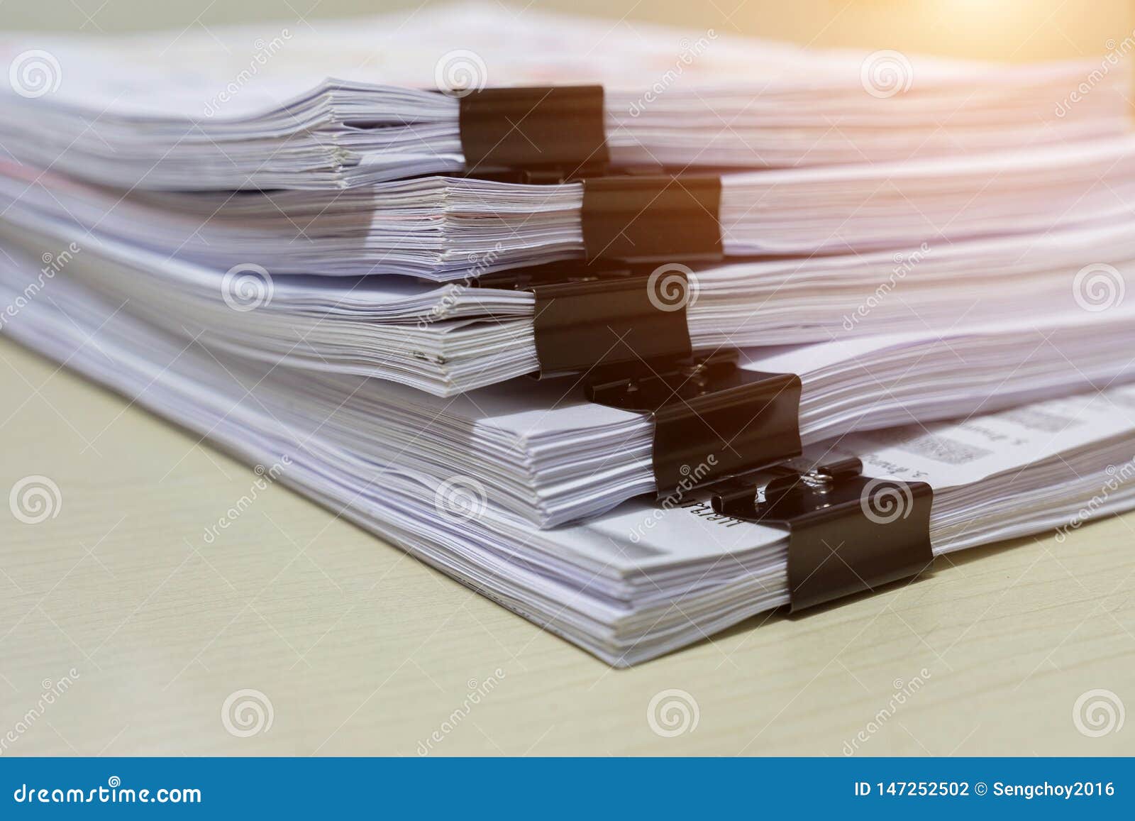 Stack of White Paperwork Achieves with Black Binder Paper Clips Stock ...