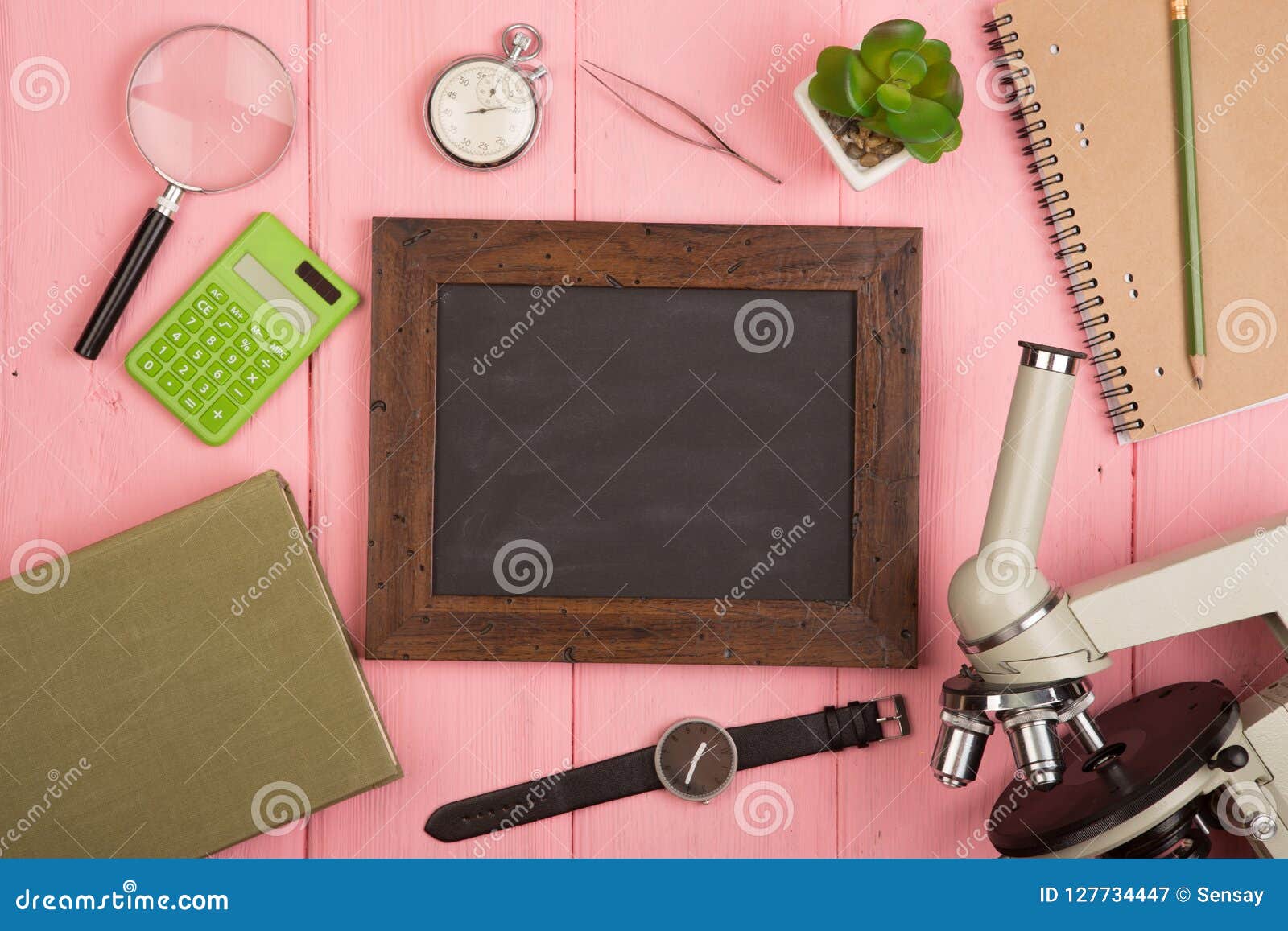 Education Concept - Notepad, Microscope on the Pink Wooden Desk Stock ...