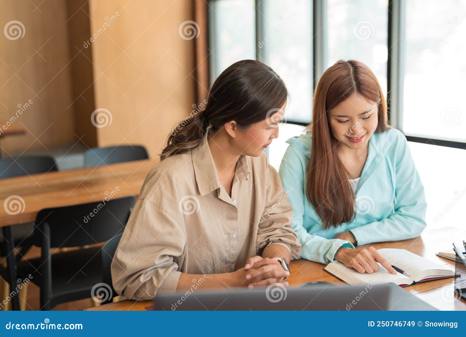 Education Concept, Teenage Girl Point on Textbook and Asking Question ...