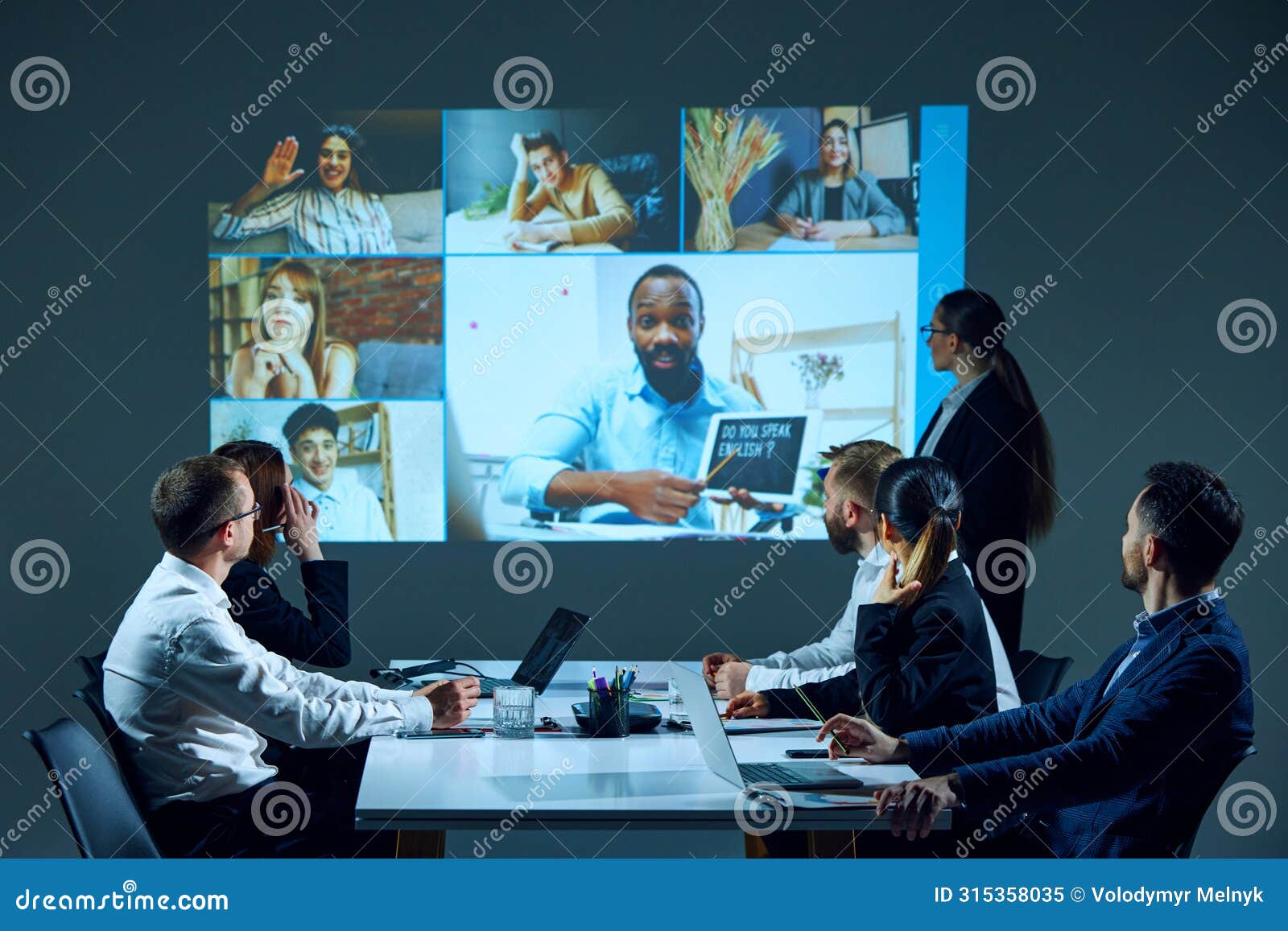 Education Courses Launching. Workers in Office Setting Engage in ...