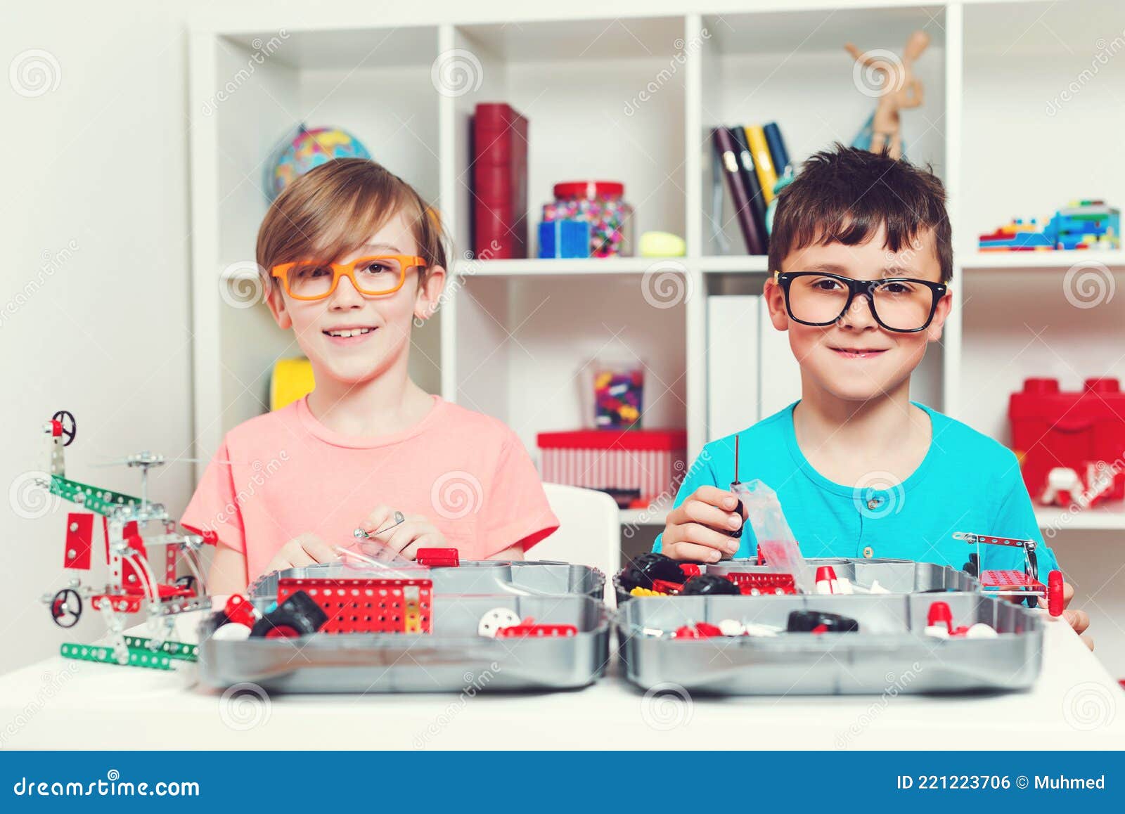 Education, Engineering and Hobby Concept. Funny Classmates Doing ...