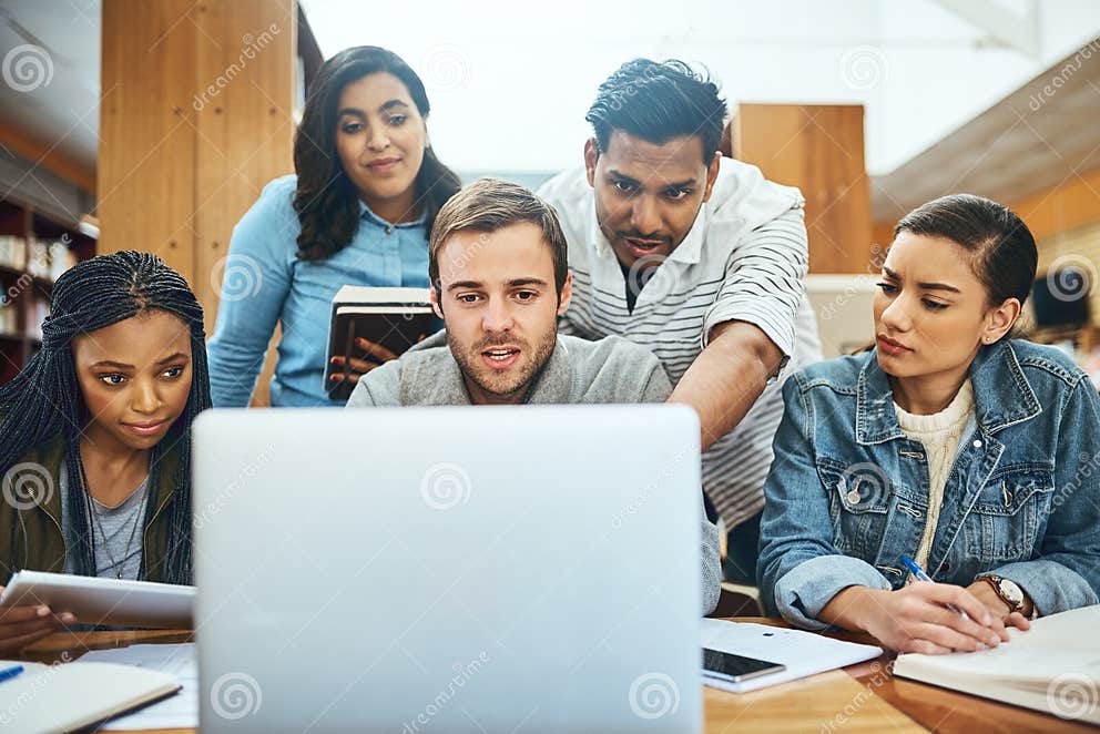 Education, Friends and Laptop in University Library for Research ...