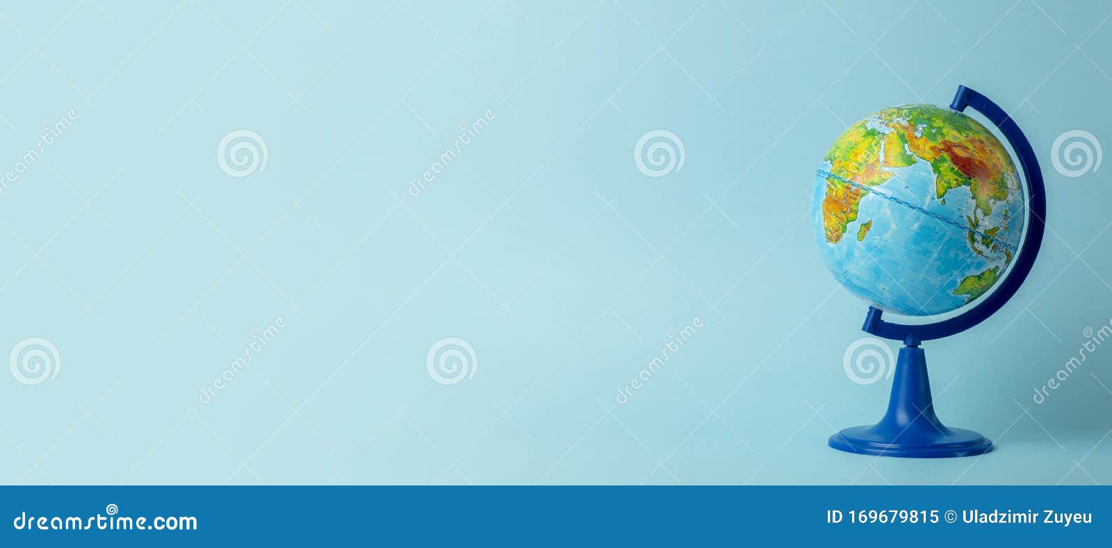 Education and Globalism Concept. Globe on an Open Book on a Table in a ...