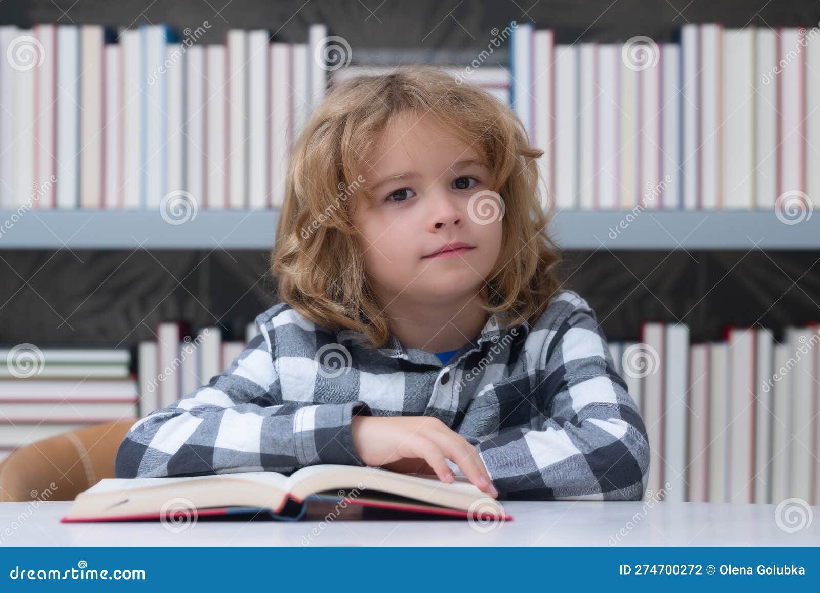 Education, Knowledge and Bookstore Concept. Child Reading Book in a ...