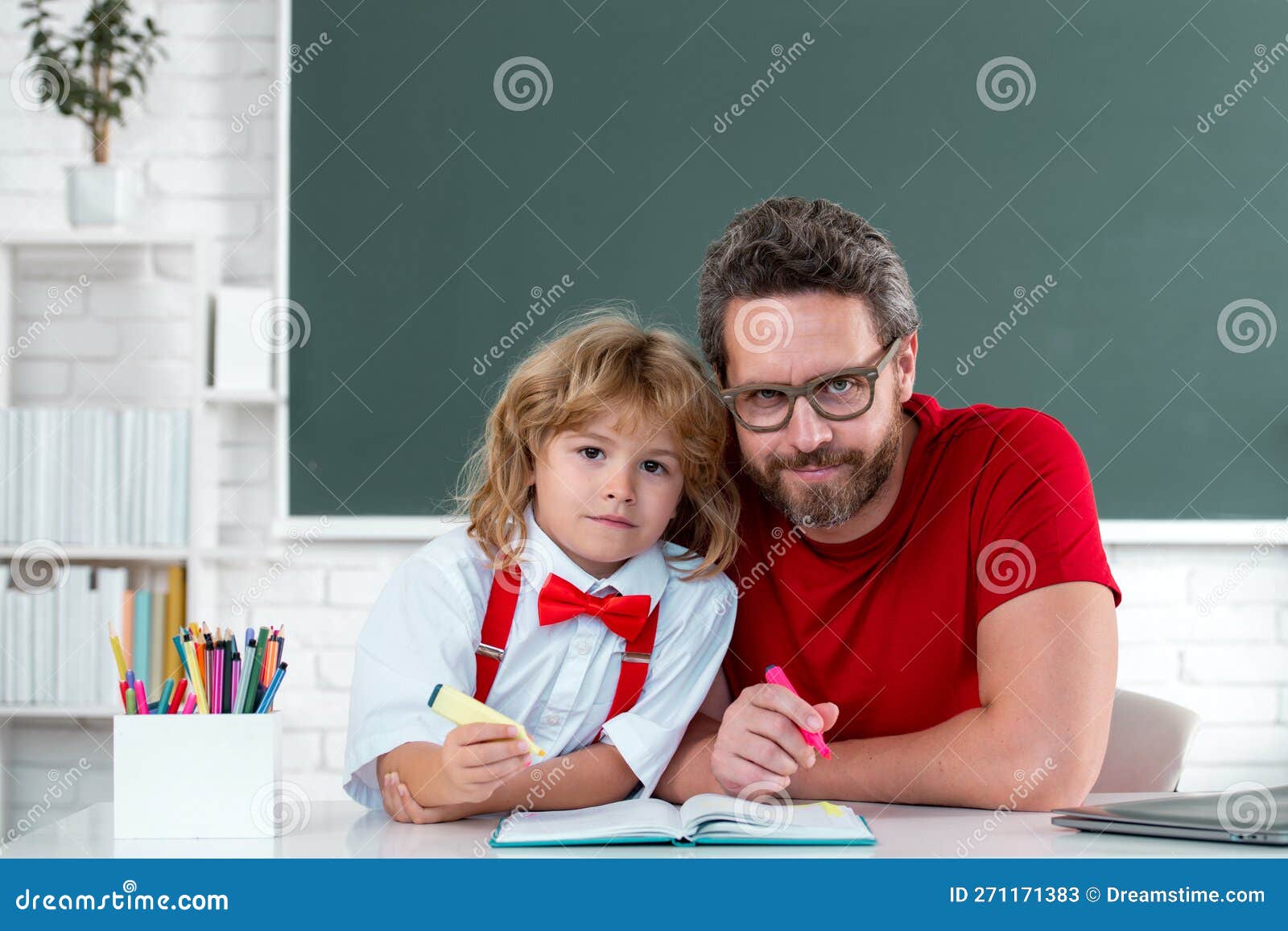 Education and Learning Concept. Father and Son Doing Homework at School ...