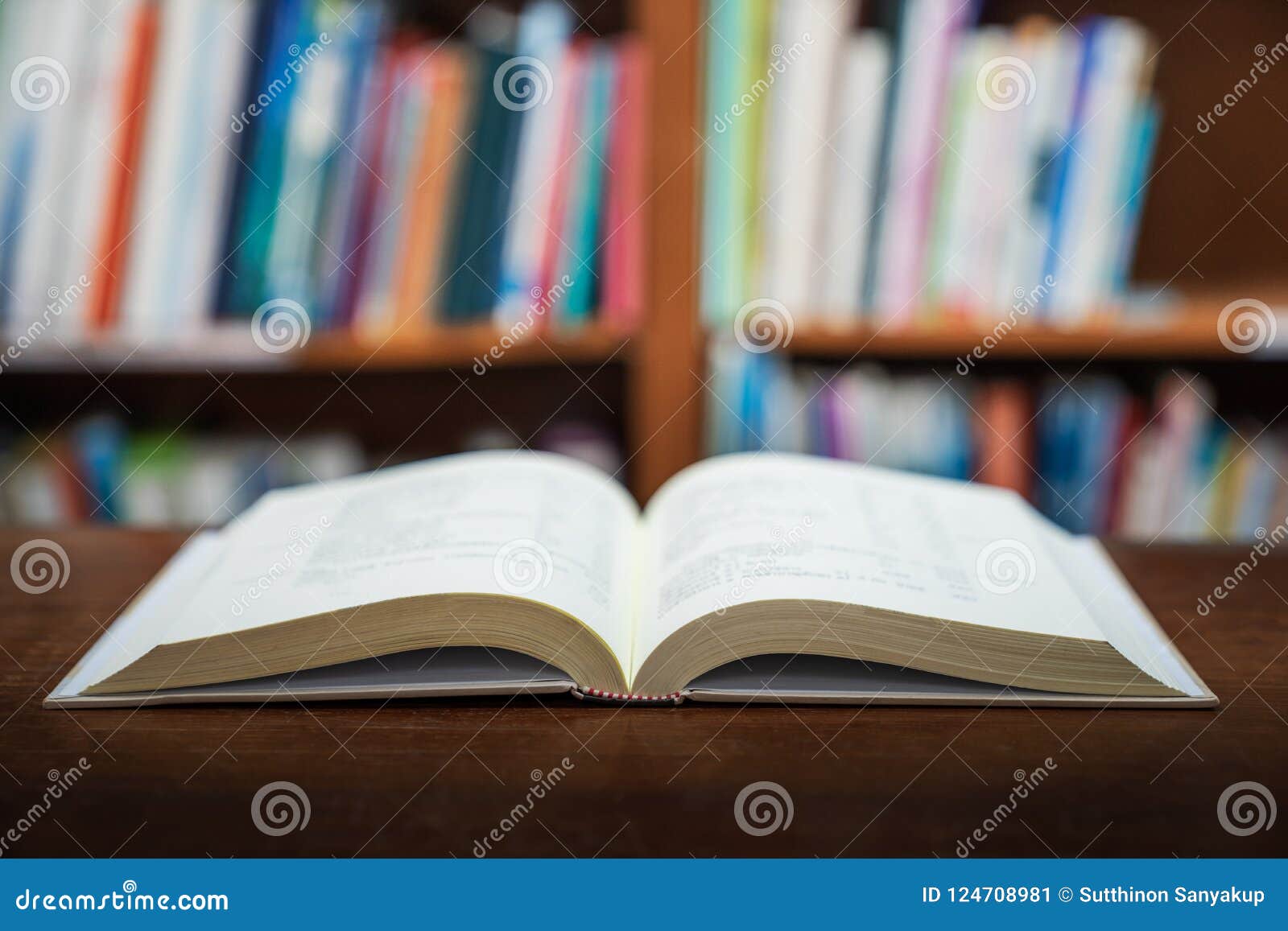 Education Learning Concept with Opening Book or Textbook in Old Library ...