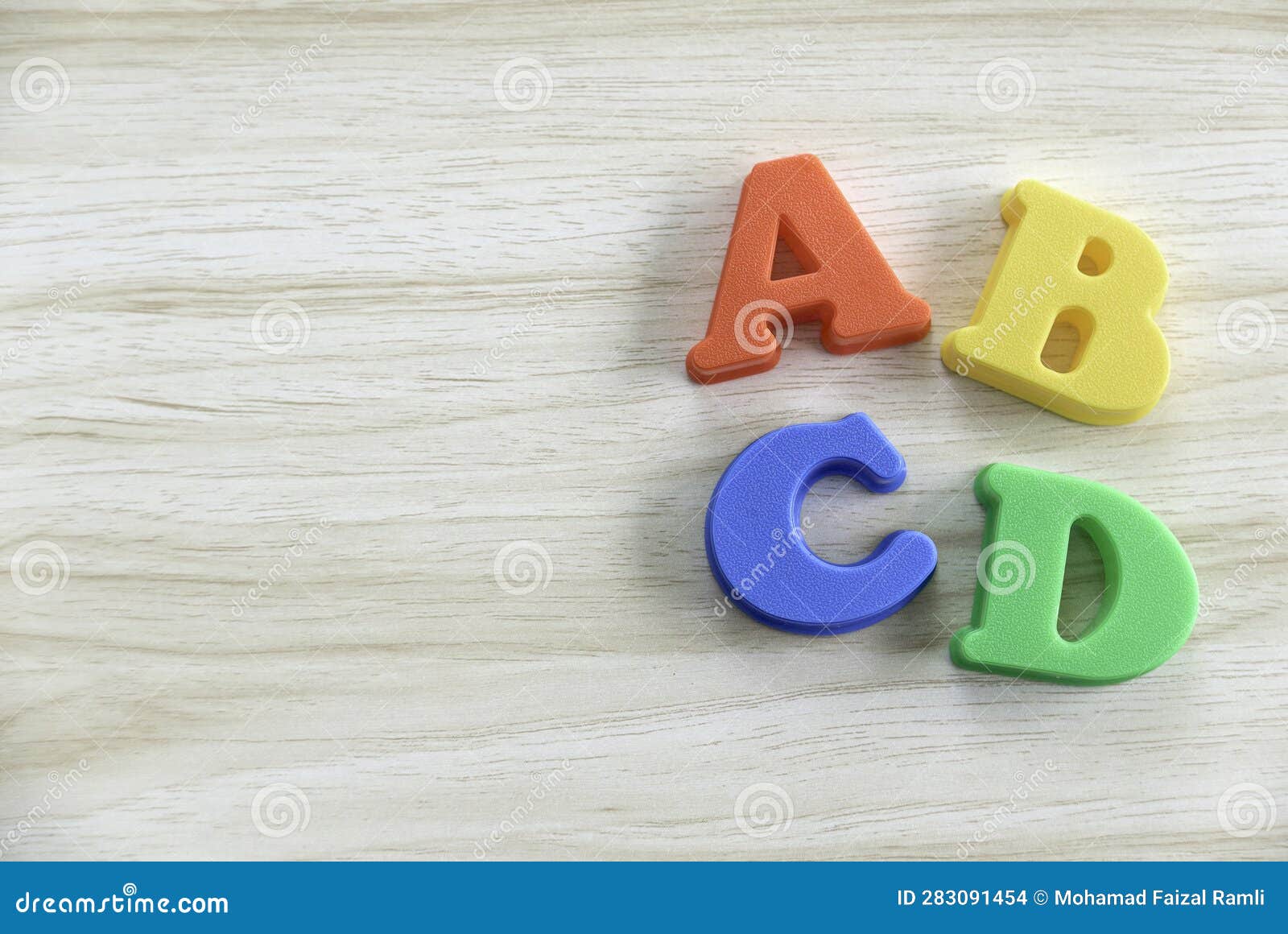 ABCD Wooden Block Alphabet Puzzle Royalty-Free Stock Photography ...