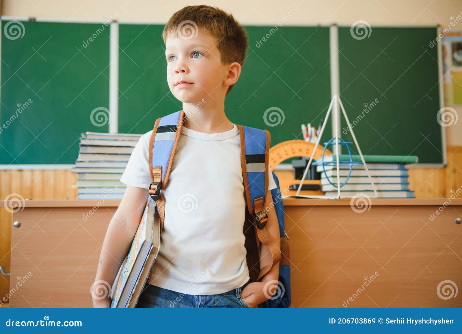 Education and Learning. Little Schoolboy in Classroom. Schoolboy Doing ...
