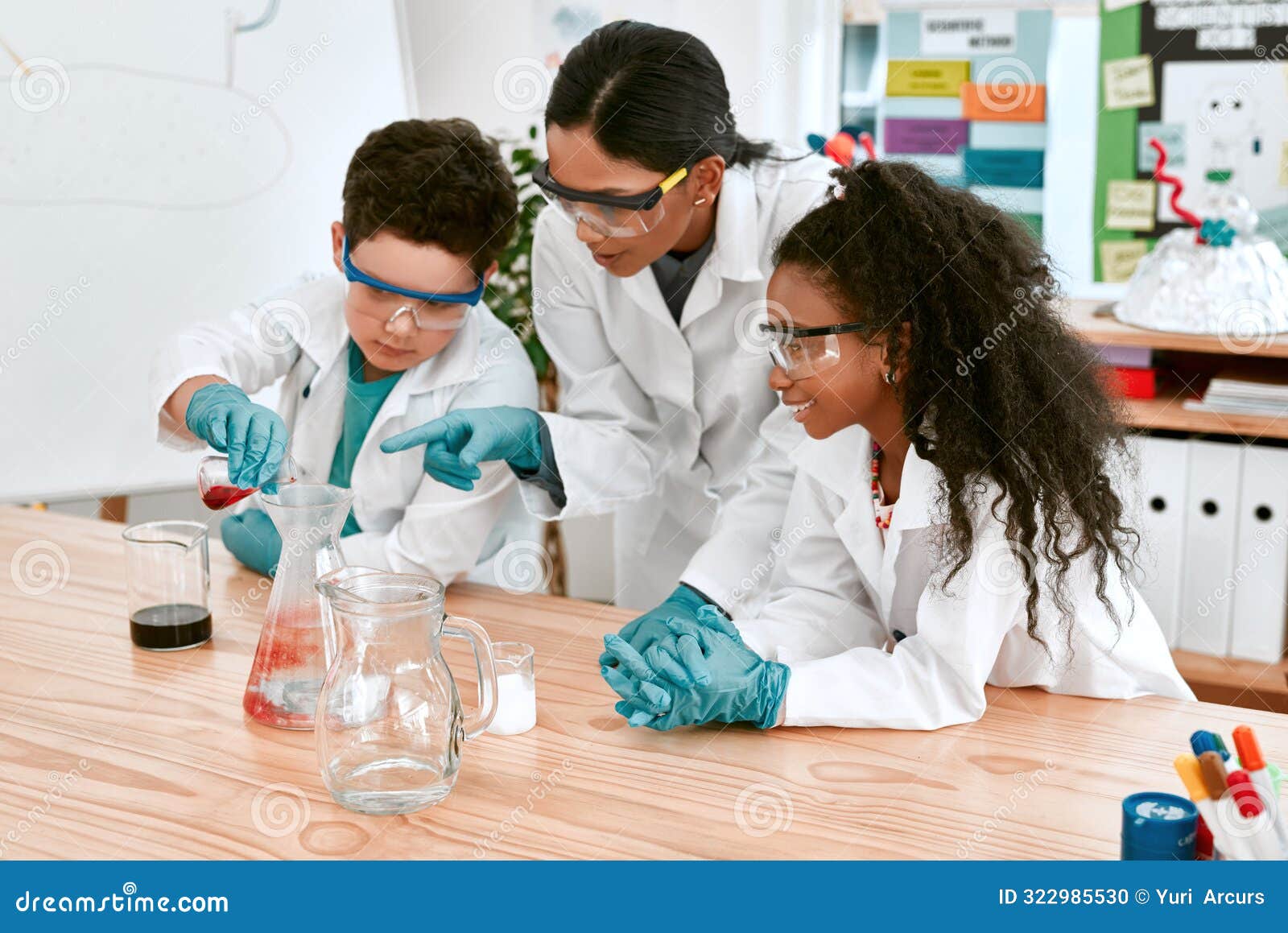 Education, Learning or Science with Teacher and Students at Table in ...