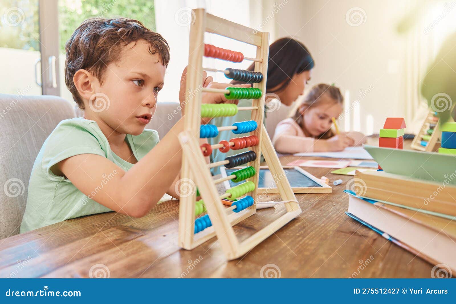 Education, Maths and a Boy Counting on an Abacus while Learning in the ...