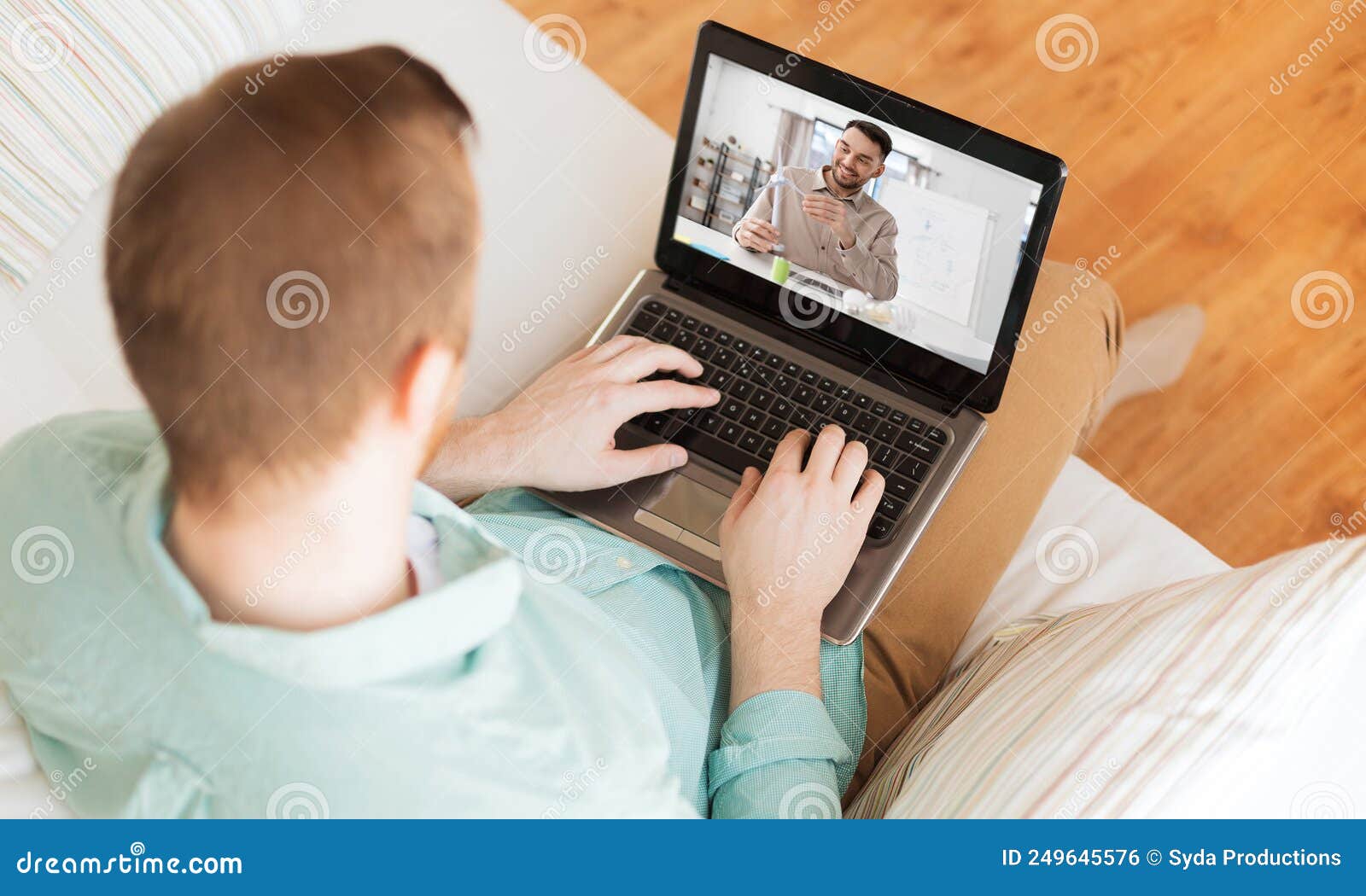 Man with Laptop Watching Tutorial Video at Home Stock Photo - Image of ...