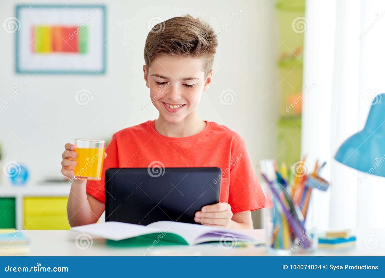 Student Boy with Tablet Pc and Juice at Home Stock Photo - Image of ...