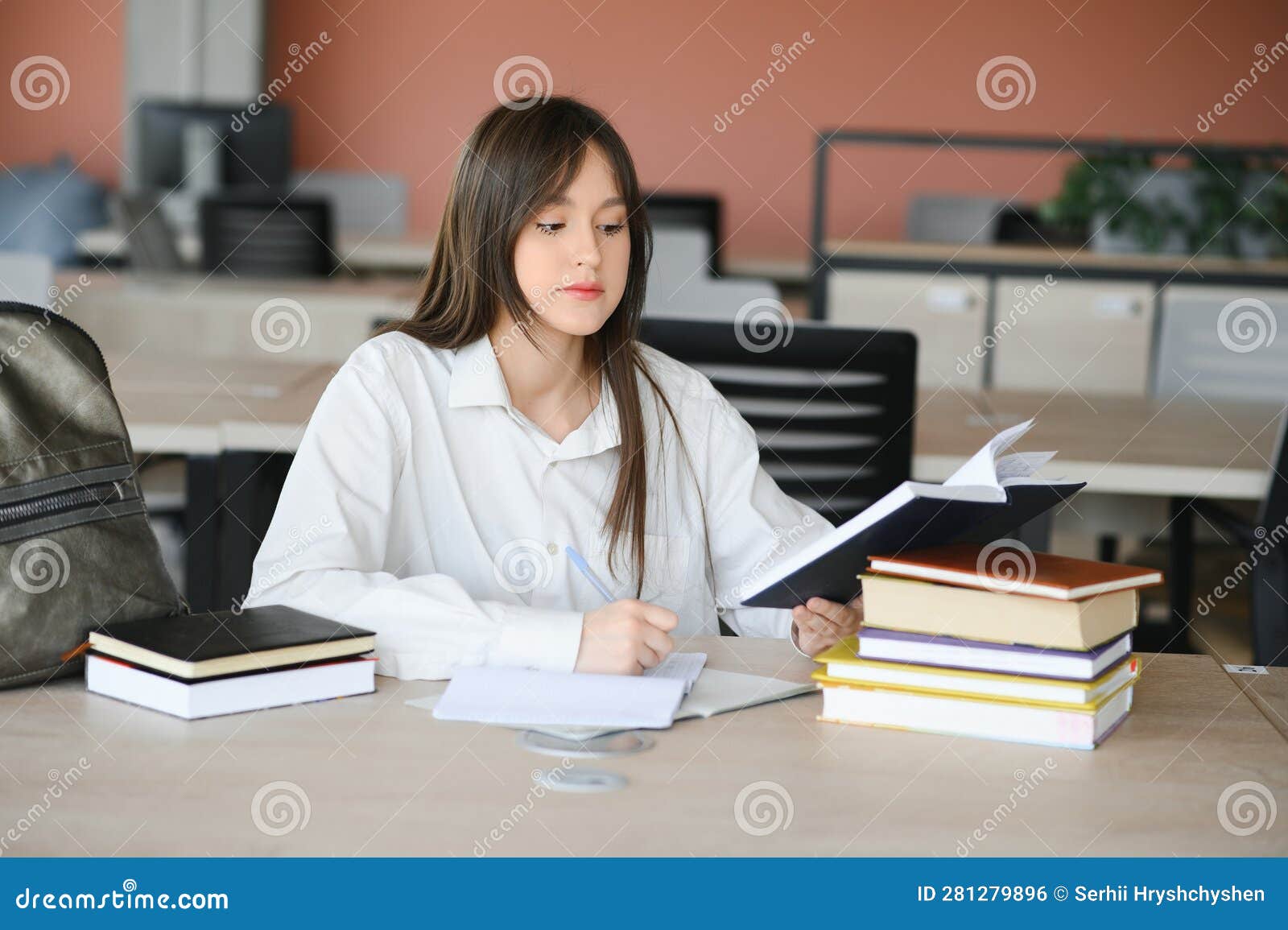 Education and School Concept - Student Girl Studying and Reading Book ...