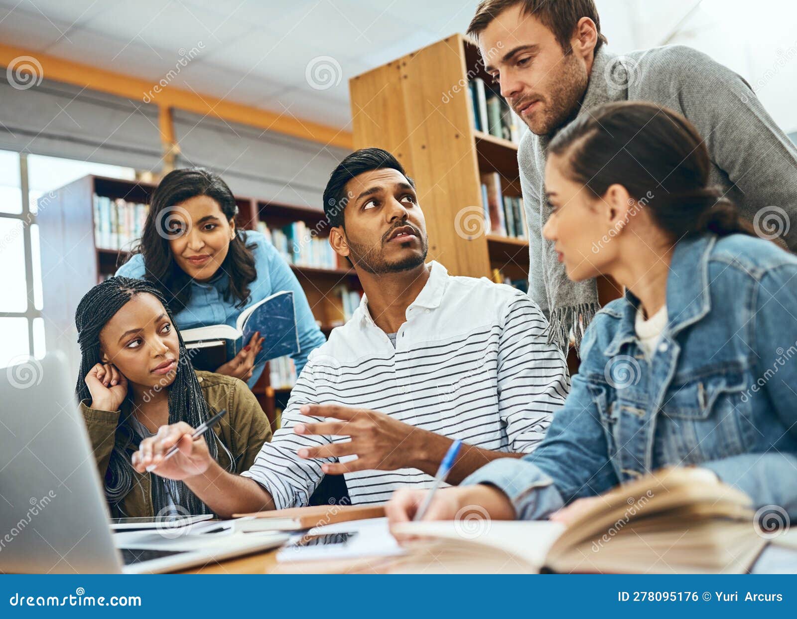 Education, Talking and Students Studying in a Library for a Group ...