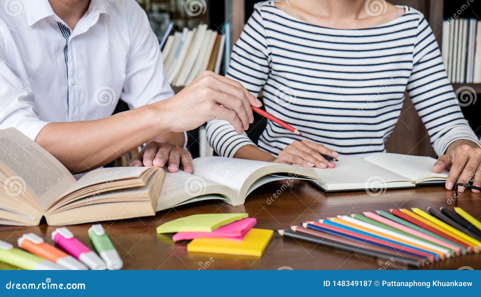 Education, Teaching, Learning Concept. Two High School Students or ...