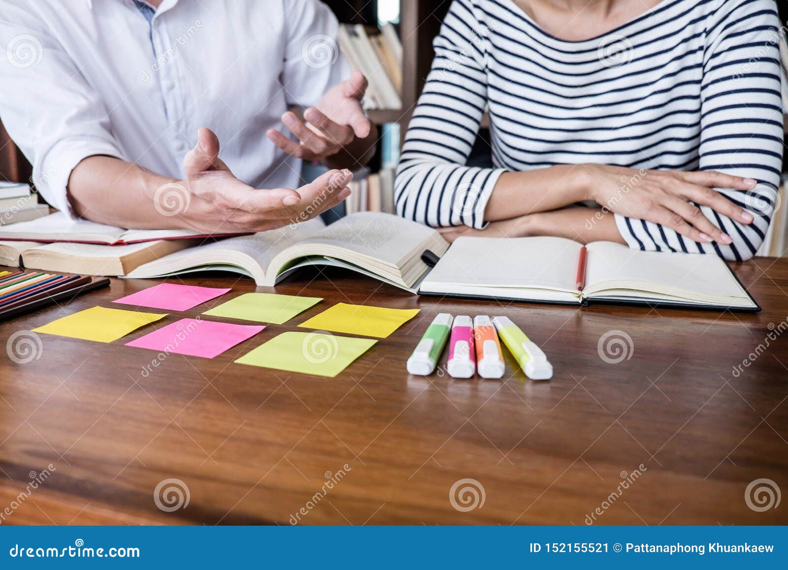 Education, Teaching, Learning Concept. Two High School Students or ...