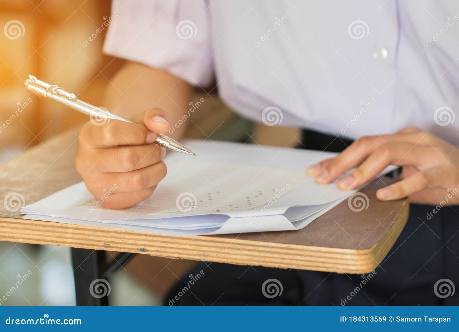 Education Test Concept : Hands Asian Students Thai Uniform Holding Pen ...