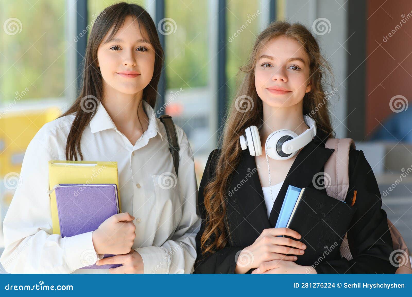 Education. Two Clever Modern Students in Black and White Uniform Study ...