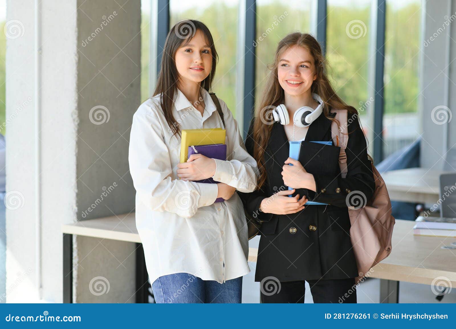 Education. Two Clever Modern Students in Black and White Uniform Study ...