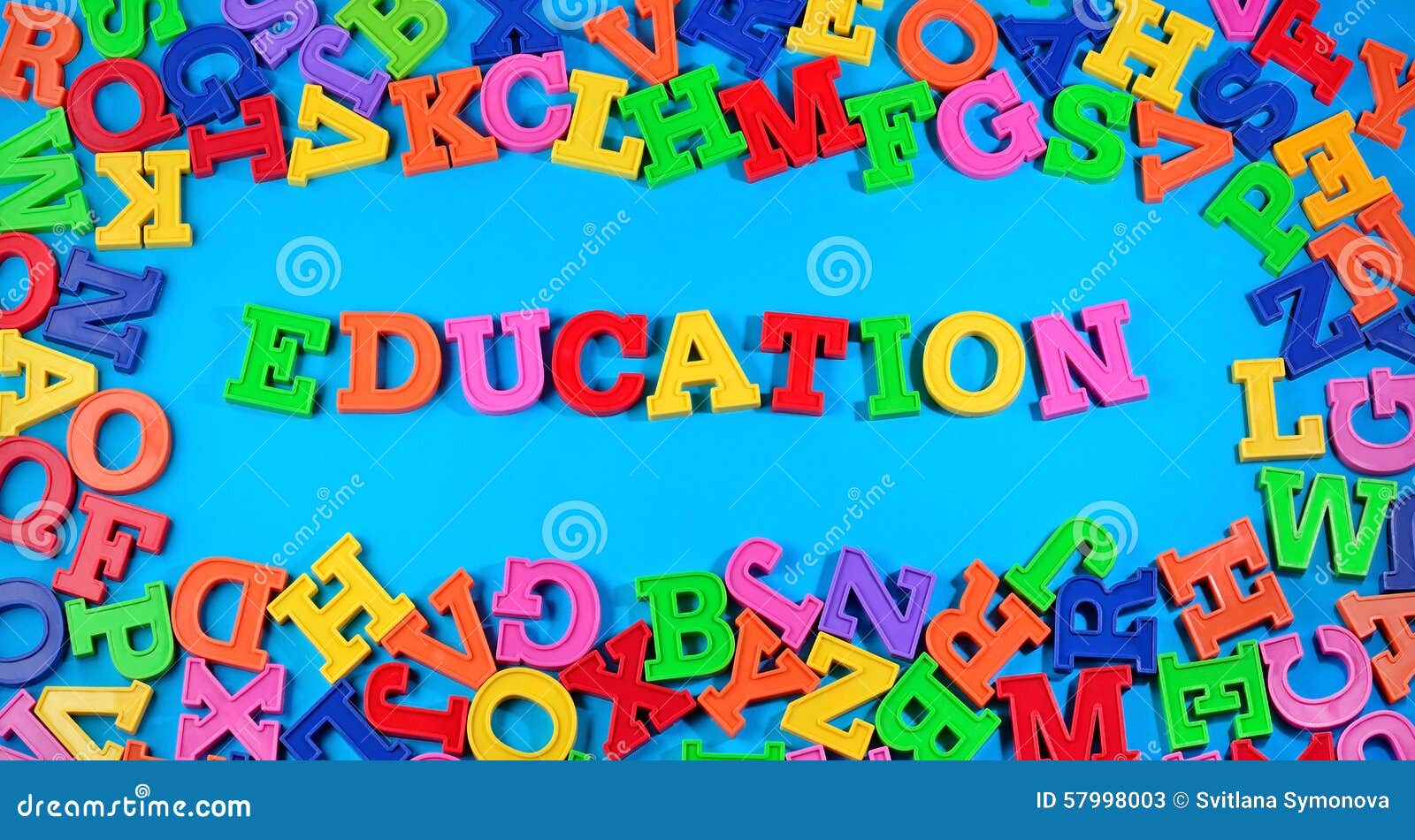 Education Written by Plastic Colorful Letters on a Blue Stock Image ...