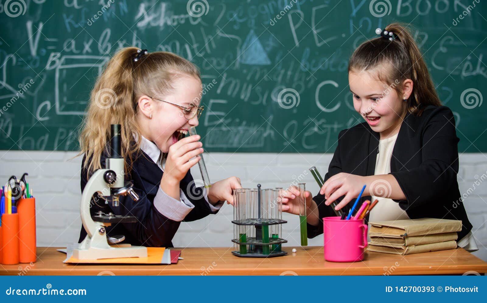 Educational Experiment Concept. Microscope And Test Tubes On Table. Be ...
